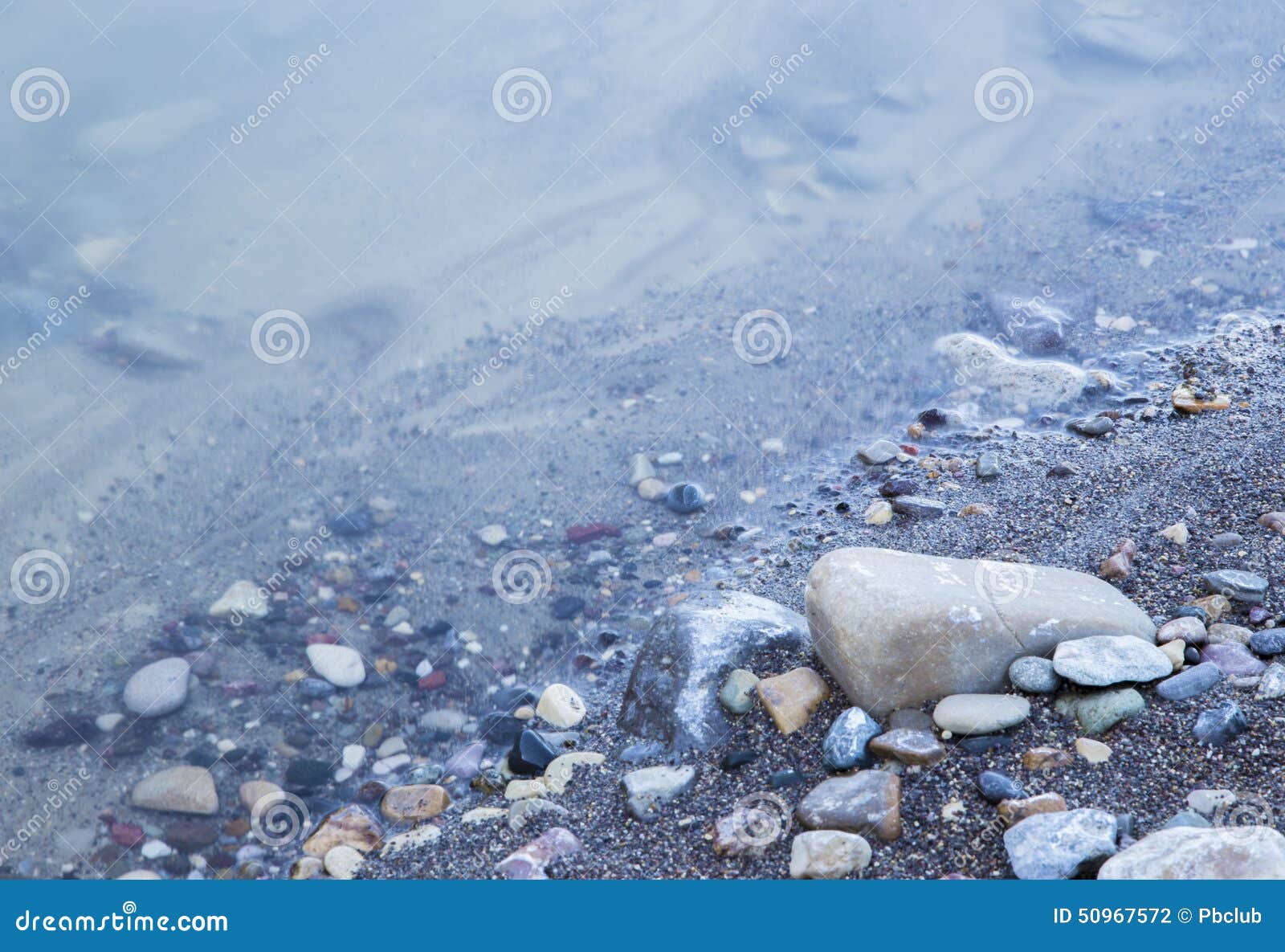 Stones and Rocks on a Beach Stock Photo - Image of textures, rocks ...
