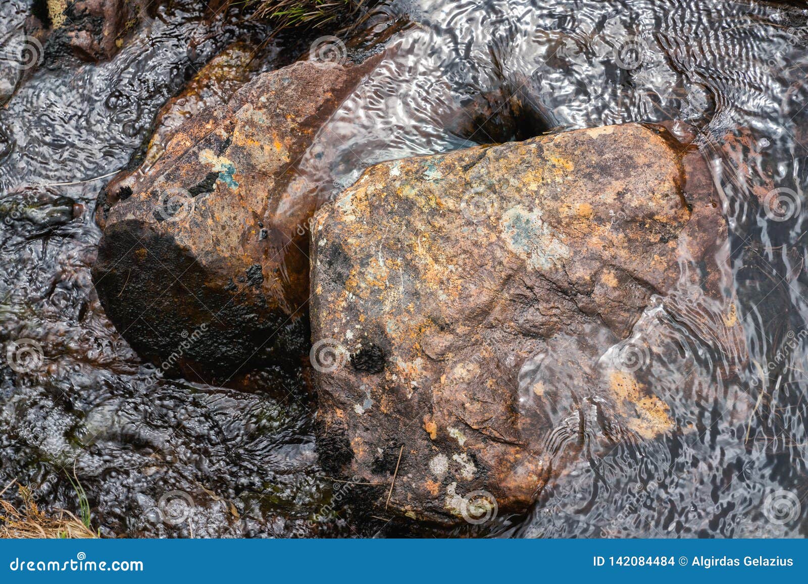 Stones in Running Water in a Mountain River Stream Stock Photo - Image ...