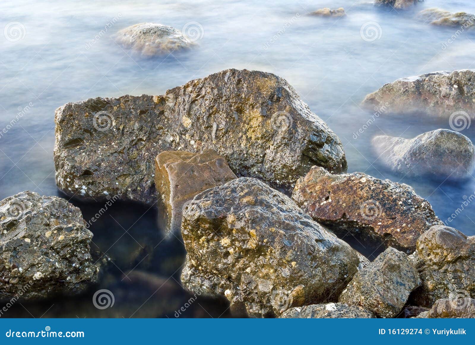 Stones in a sea stock photo. Image of horizon, dusk, nature - 16129274