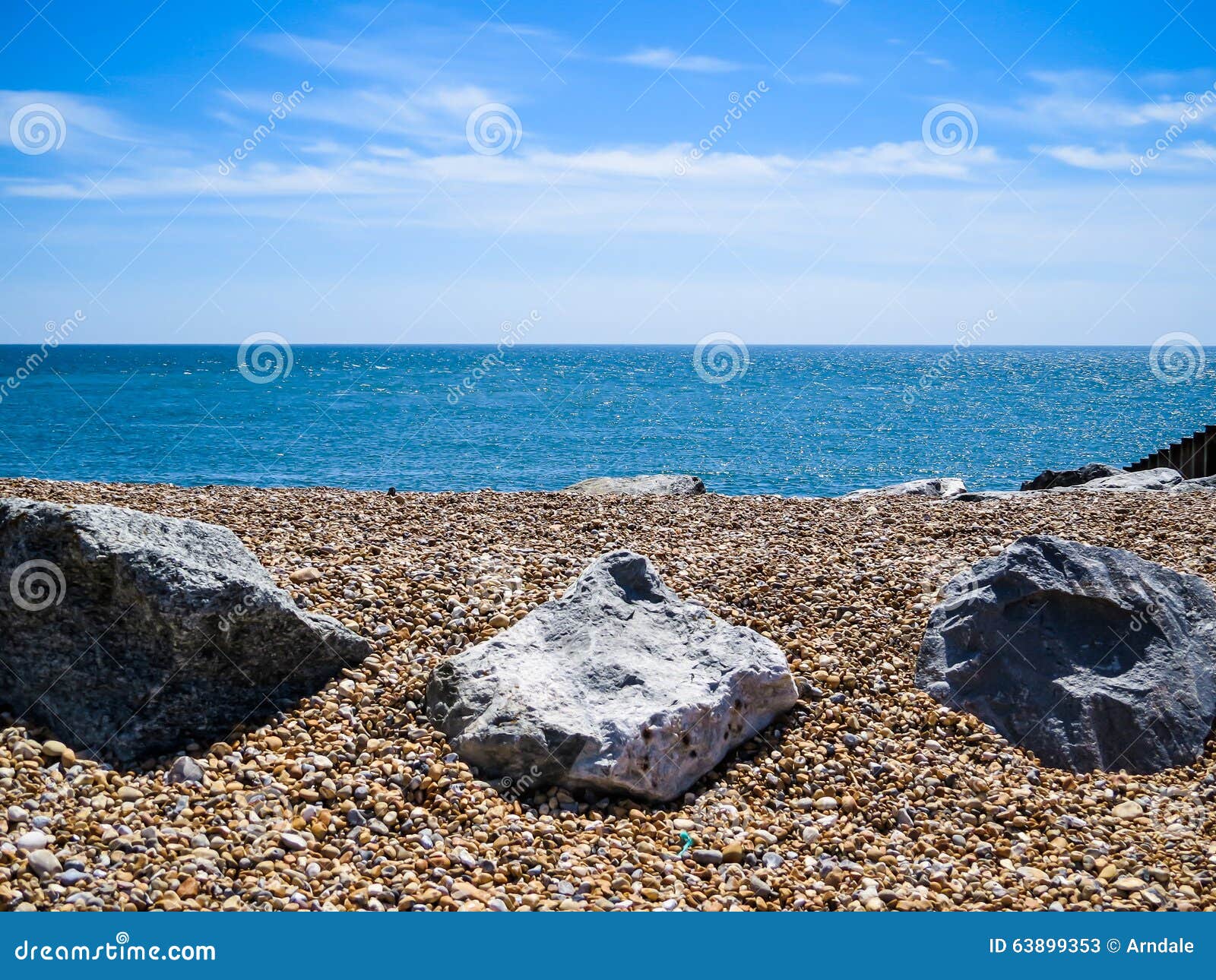 Stones on the sea coast stock image. Image of three, stone - 63899353
