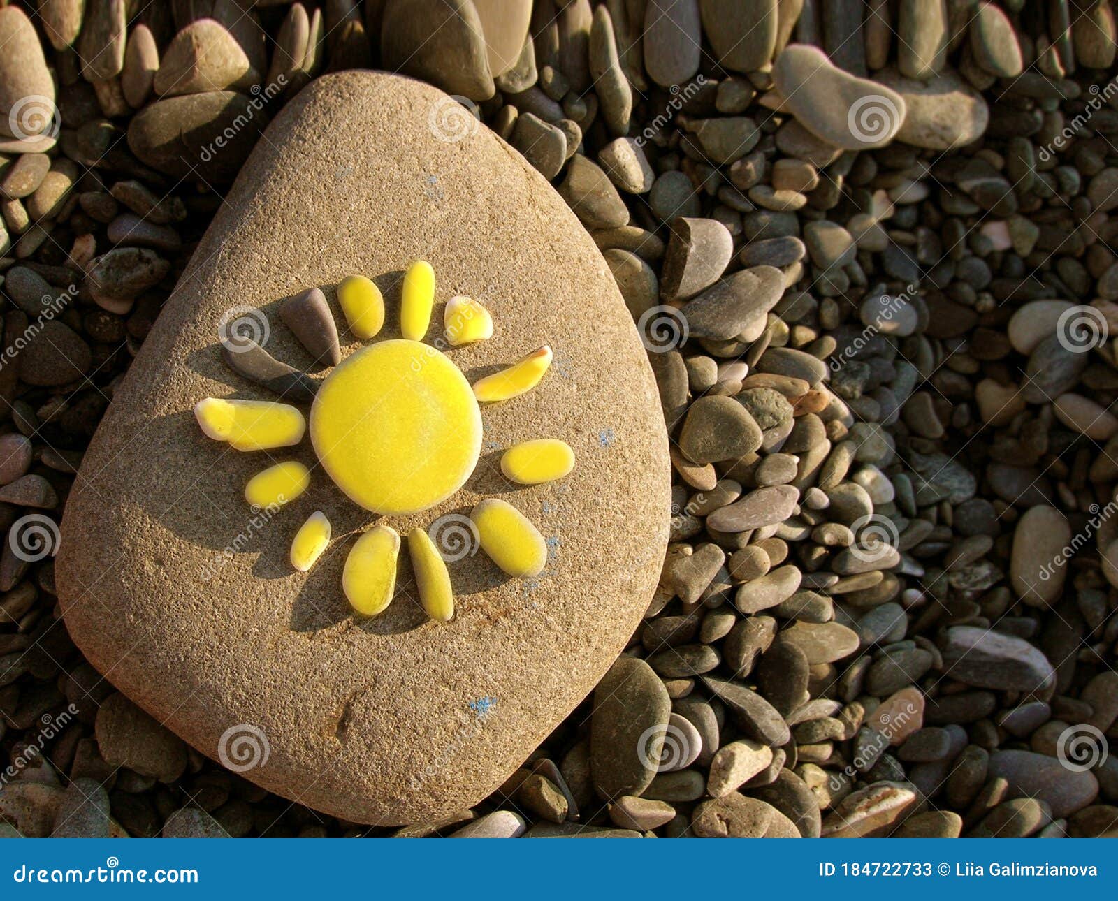 Stones in a shape of sun stock image. Image of beach - 184722733