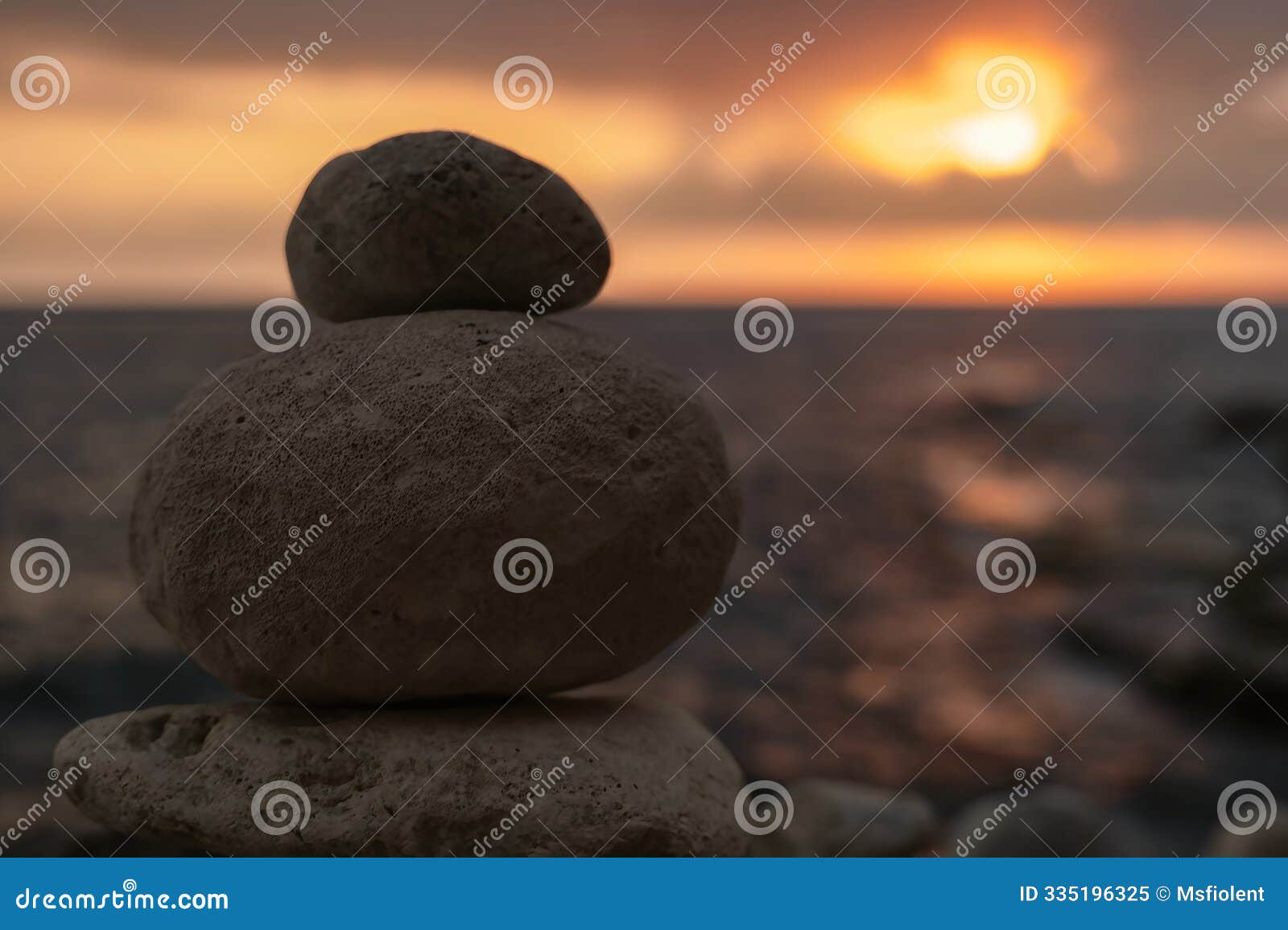 Stones Stacked Sunset Beach - a Balanced Stack of Rocks Stands on a ...