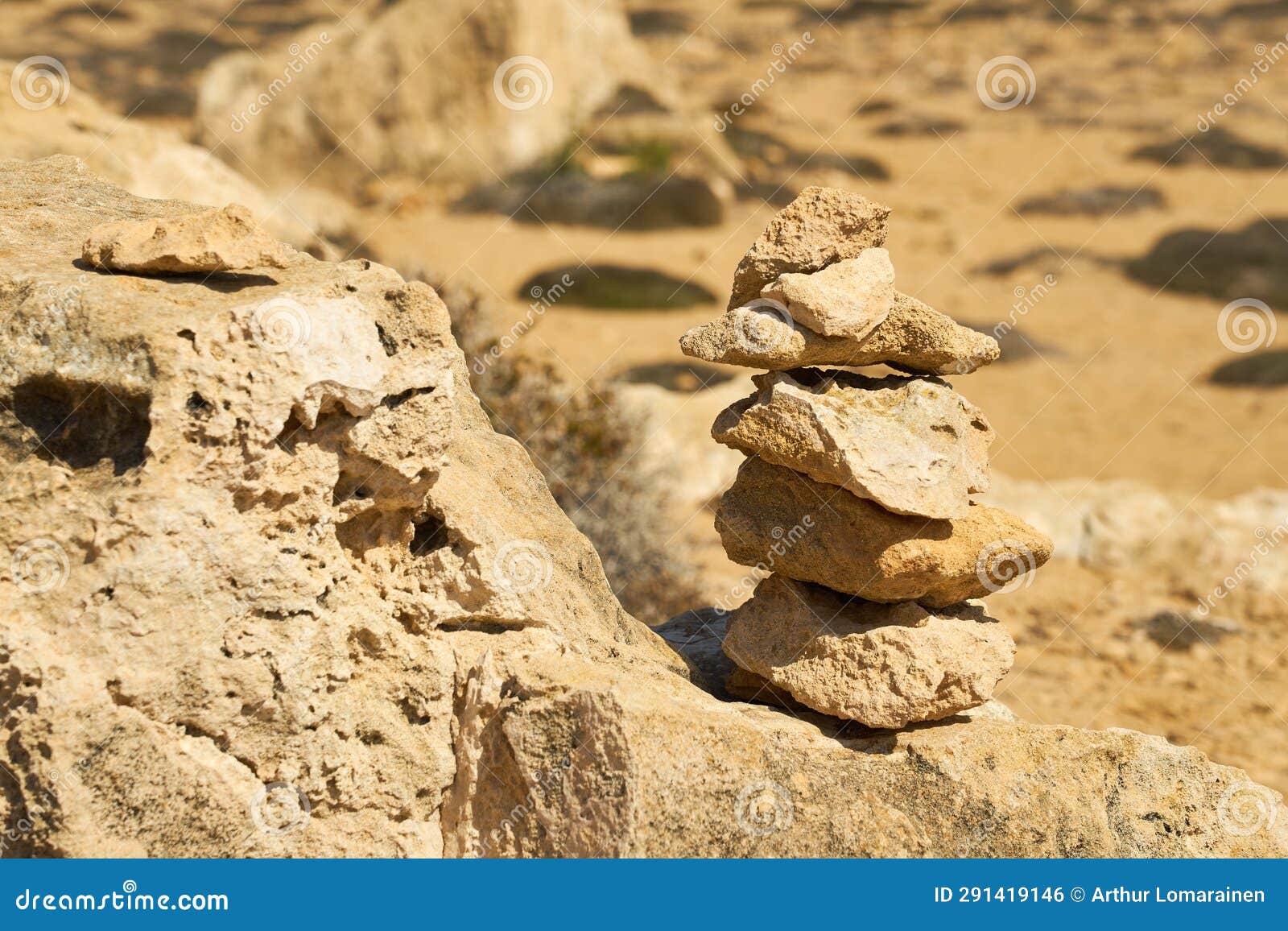 Stones Stacked on Top of Each Other with a Blurred Background. Stock ...
