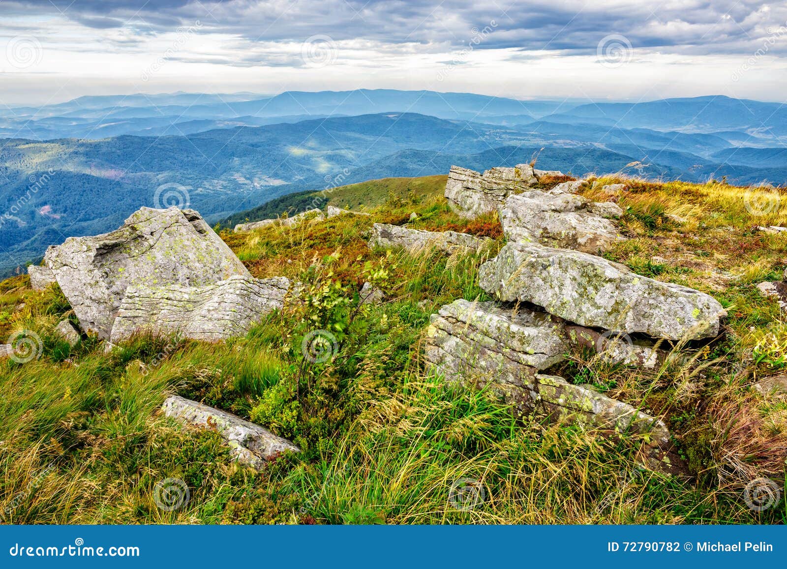 Stones in Valley on the Edge of Mountain Range Stock Photo - Image of ...