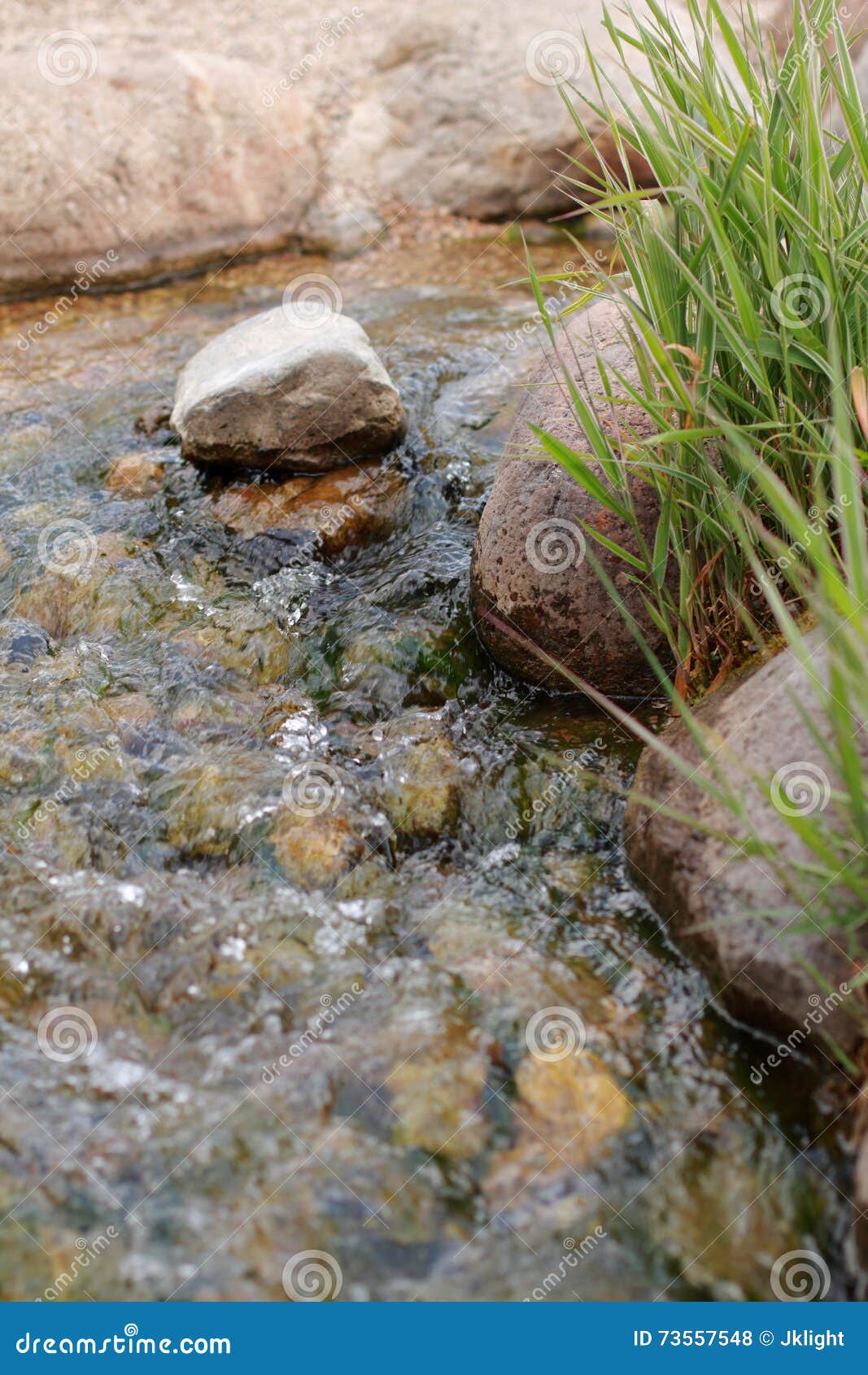 Stones in water stream. stock photo. Image of environment - 73557548