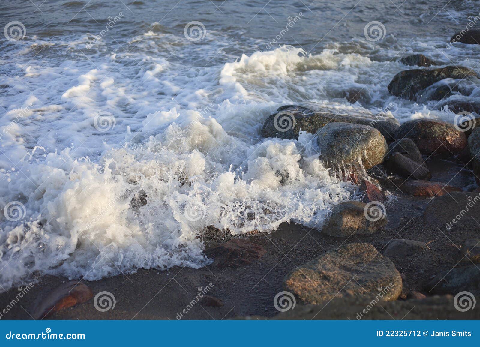 Stones in waves. stock photo. Image of cold, stone, froth - 22325712