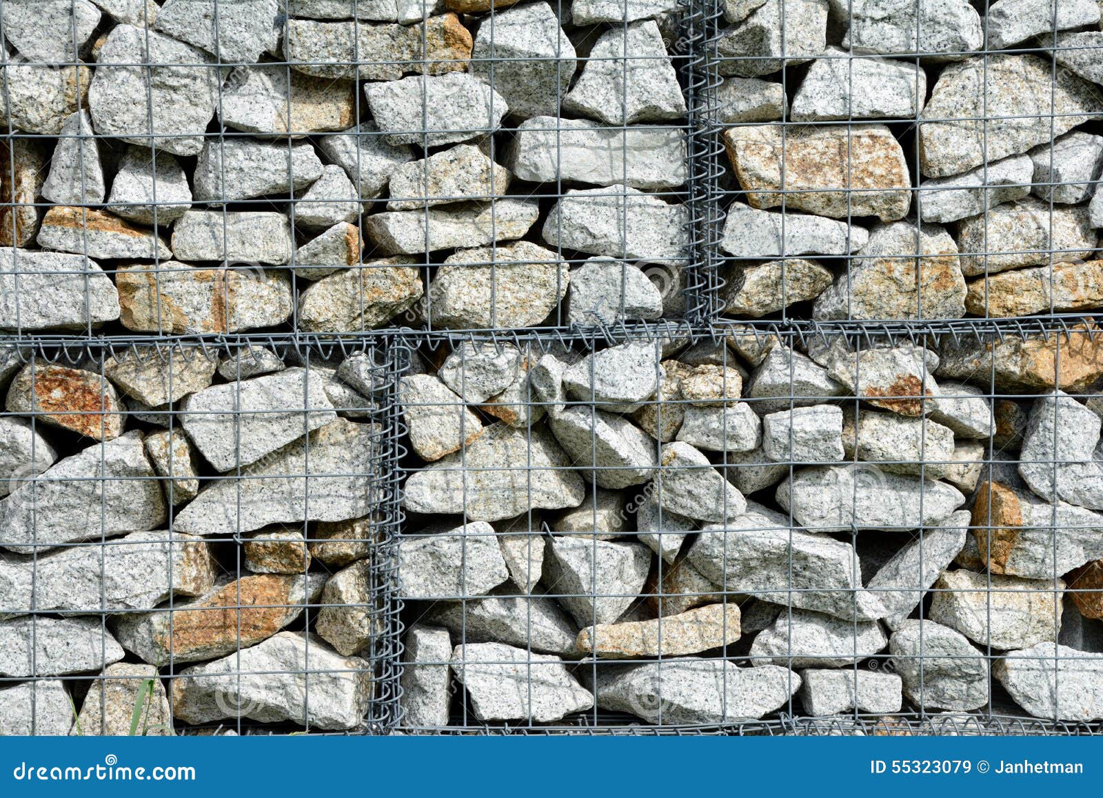 Stones in wire net stock image. Image of pattern, wall - 55323079