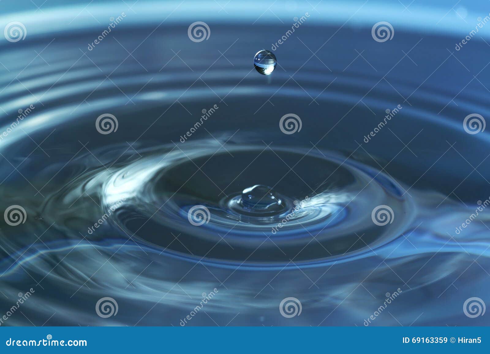 Stop Action Photo of Water Drop with Reflection Stock Image - Image of ...