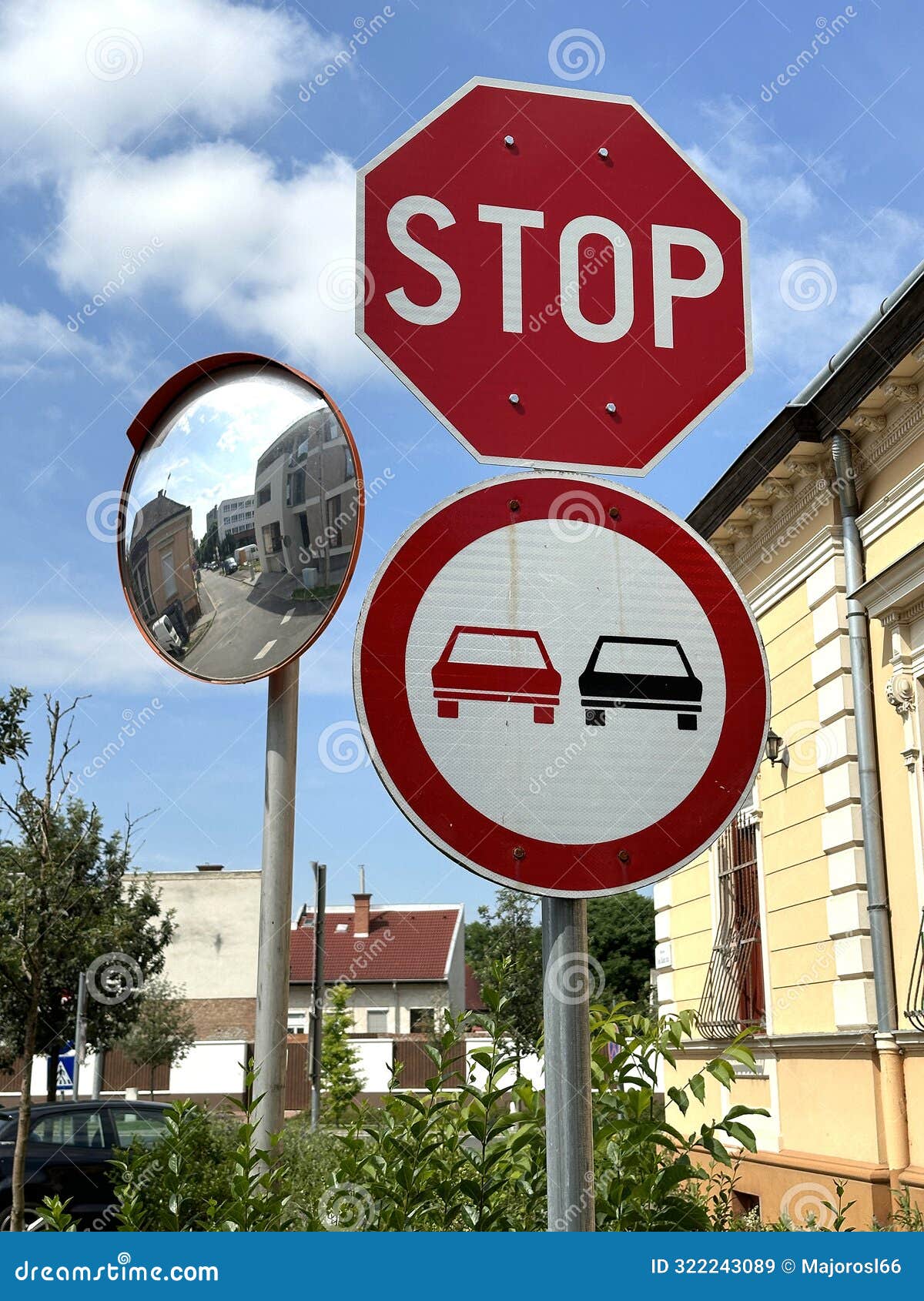 Stop and Do Not Overtaking Sign at the Road Crossing Stock Image ...