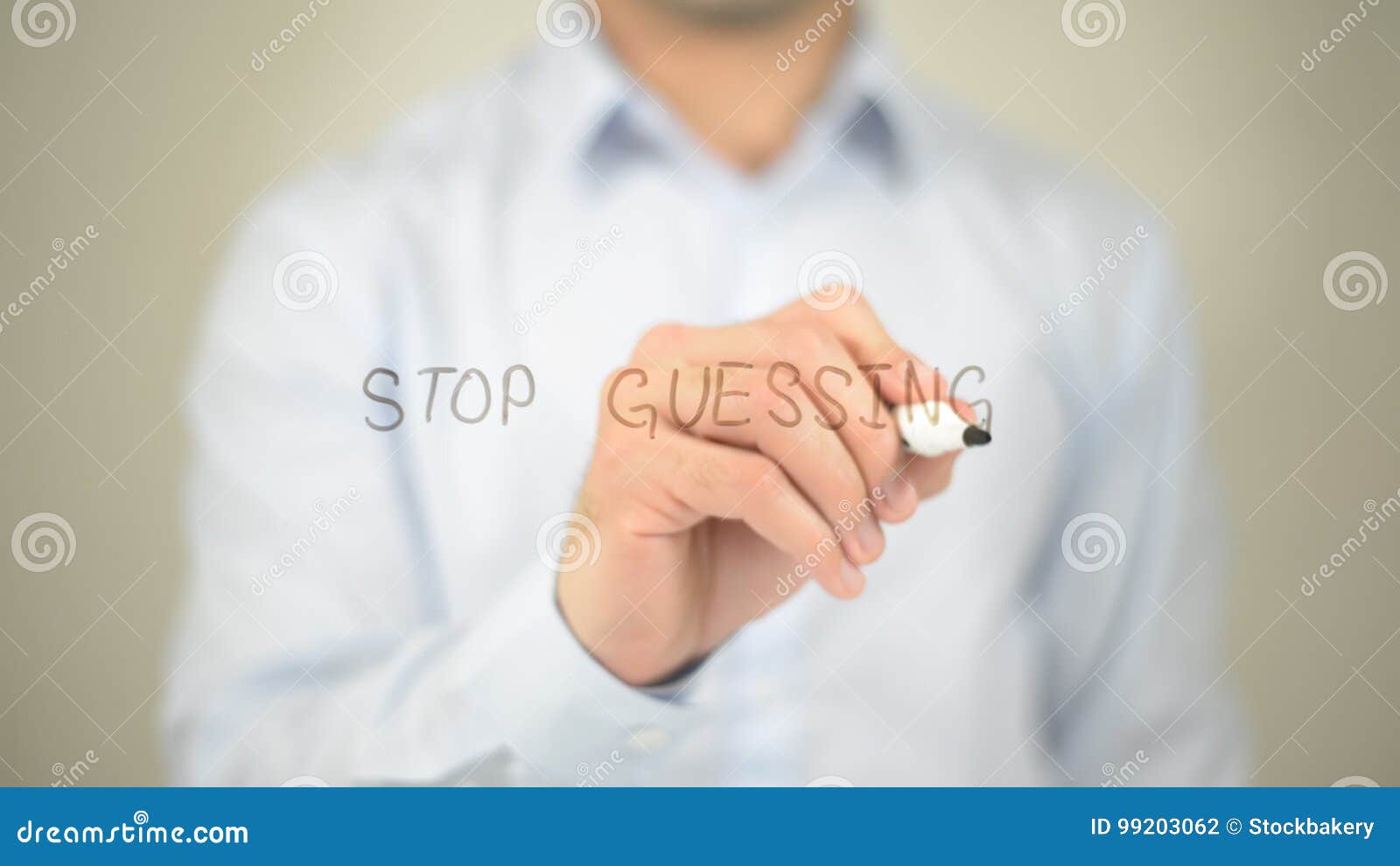 Stop Guessing , Man Writing on Transparent Screen Stock Photo - Image ...