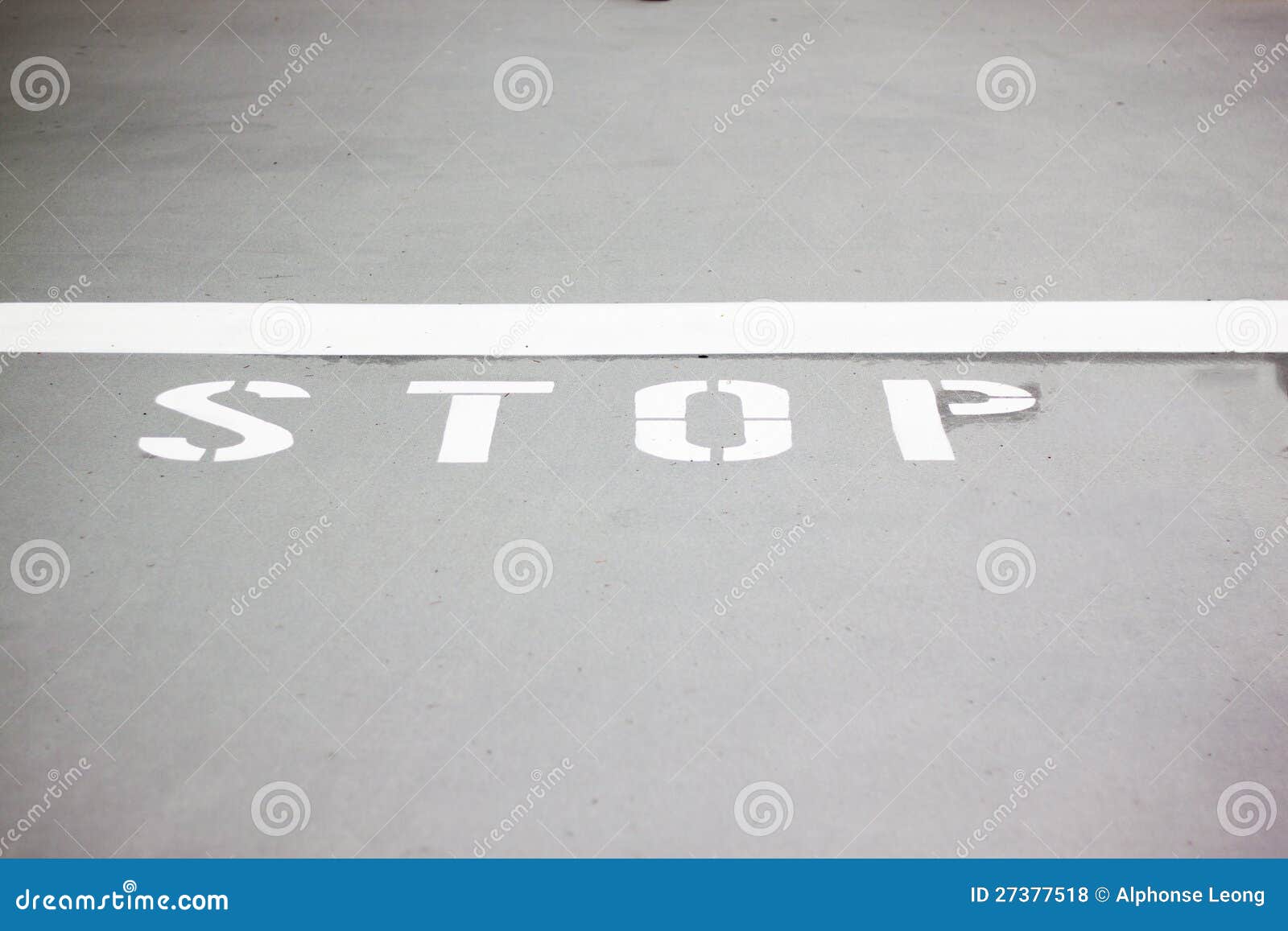 Stop message on pavement stock photo. Image of street - 27377518
