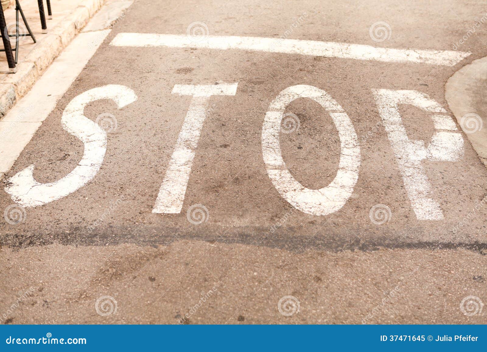 Stop Painted on Asphalt Outdoor Stock Image - Image of pause, word ...