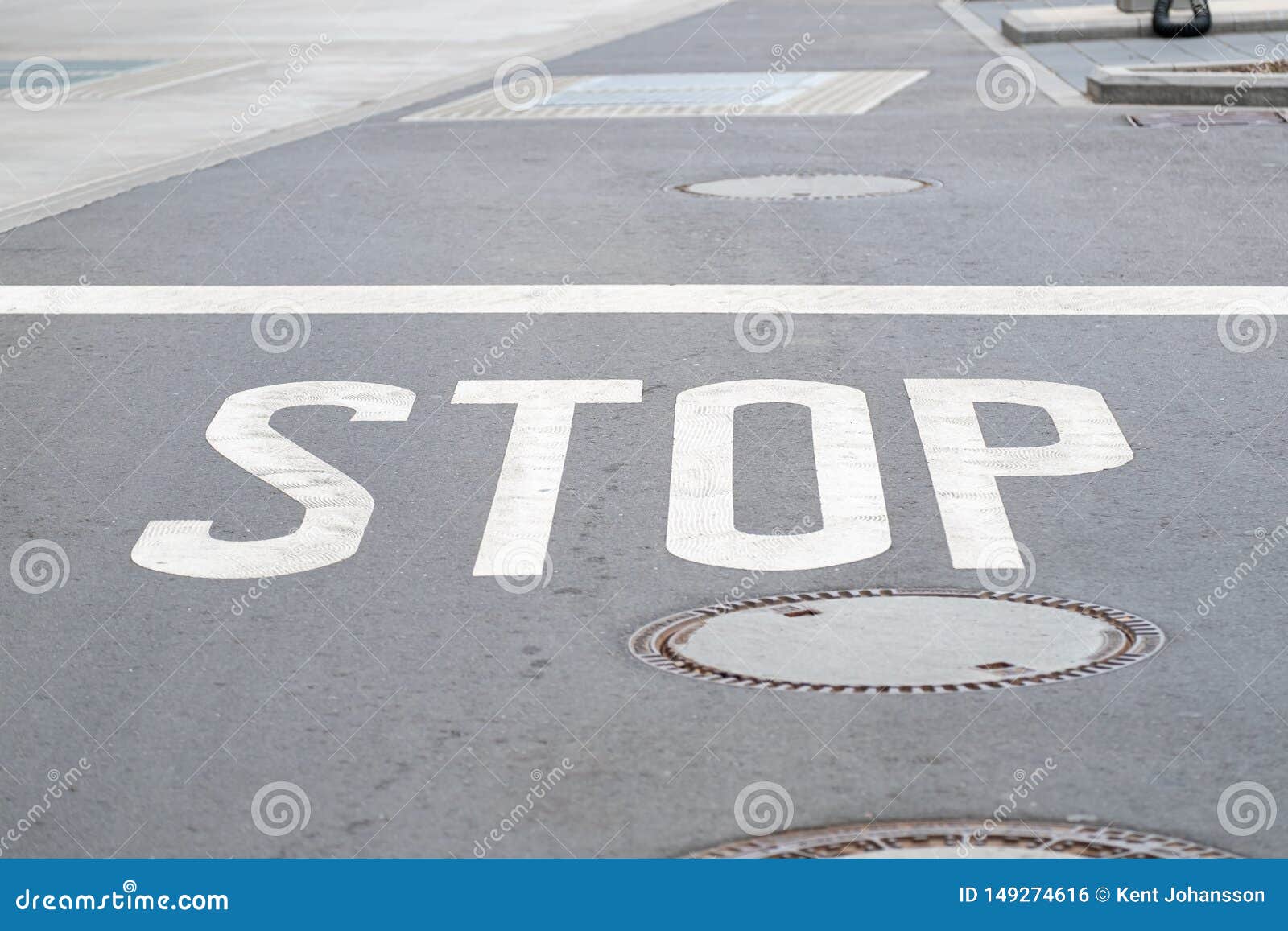 STOP painted on asphalt stock photo. Image of forbidden - 149274616