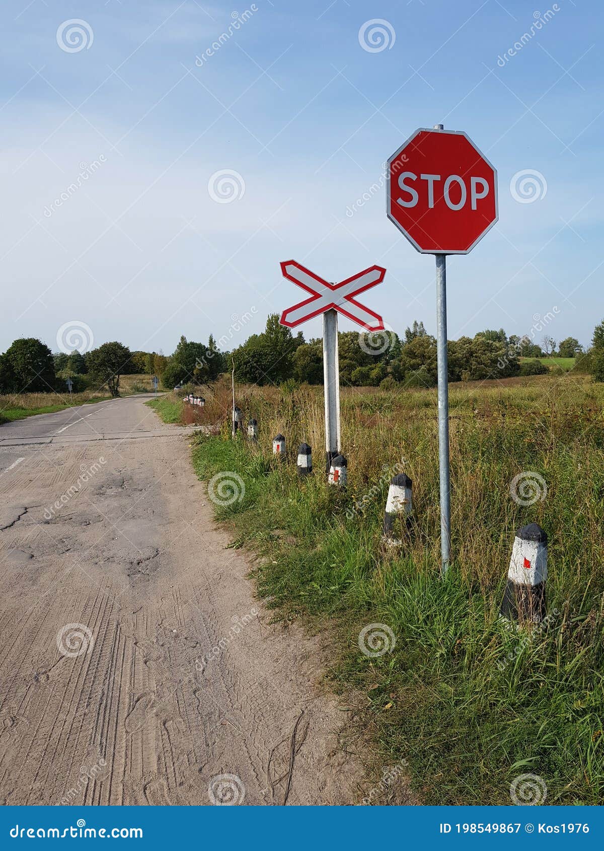 Stop Sign in Front of a Railway Crossing Stock Image - Image of clouds ...