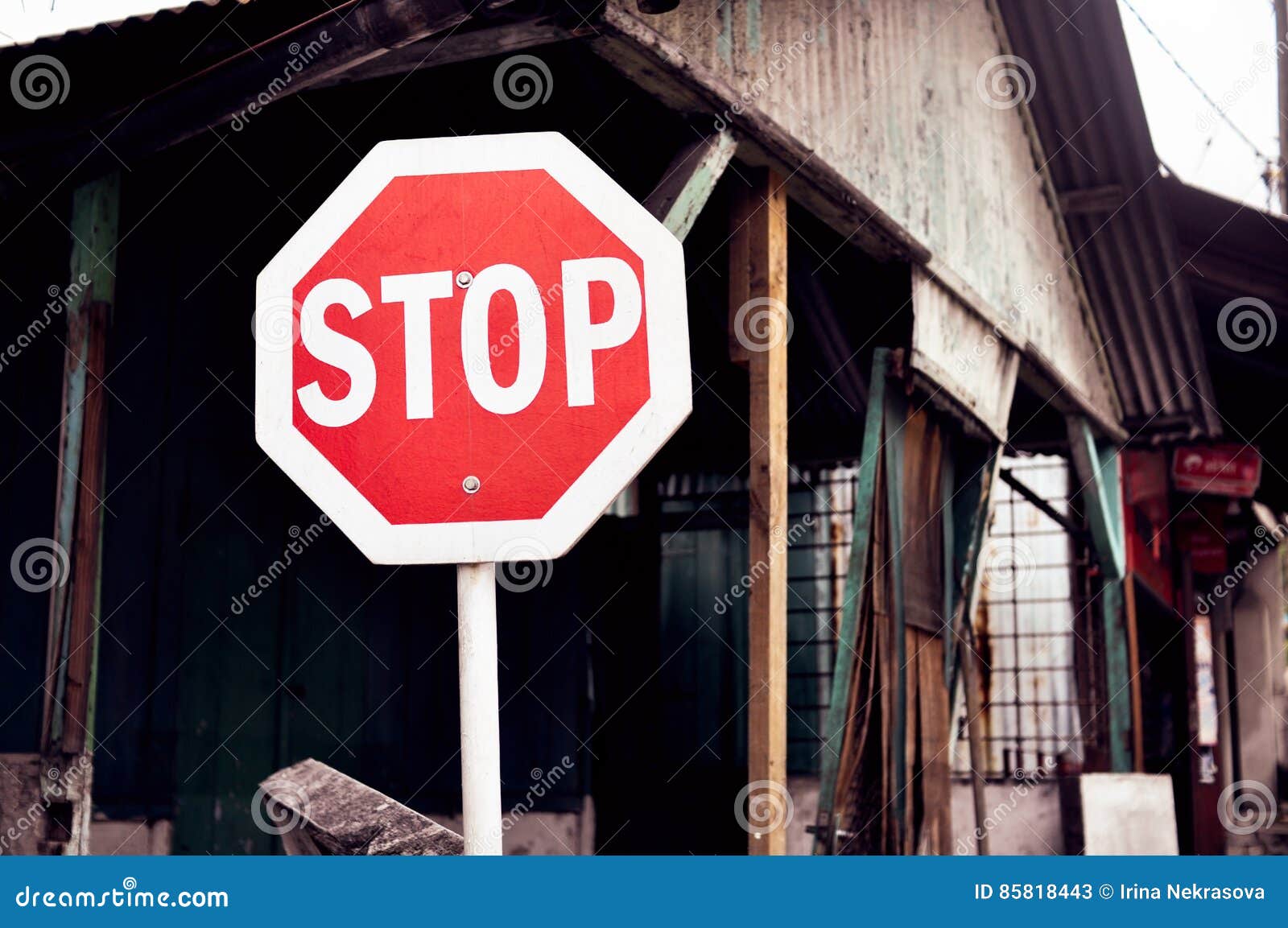 Stop Sign Against the Backdrop of Dilapidated Housing Stock Image ...