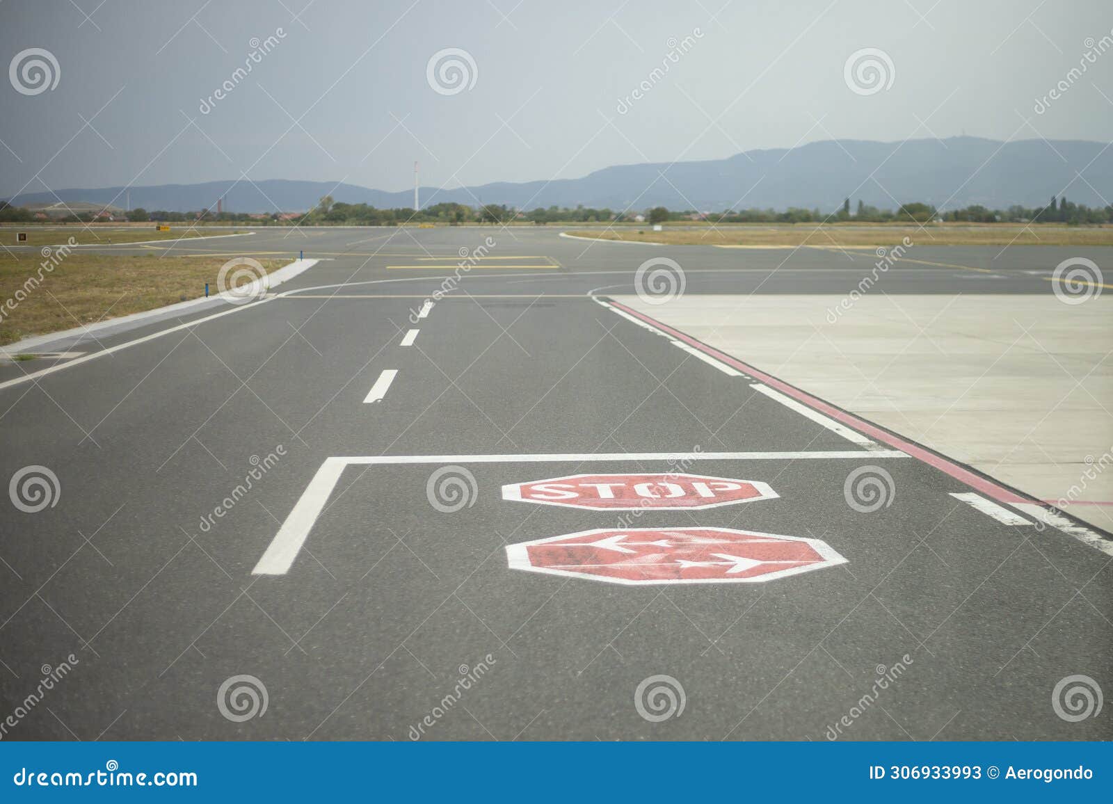 Stop Sign on Airport Runway Stock Image - Image of terminal, signs ...