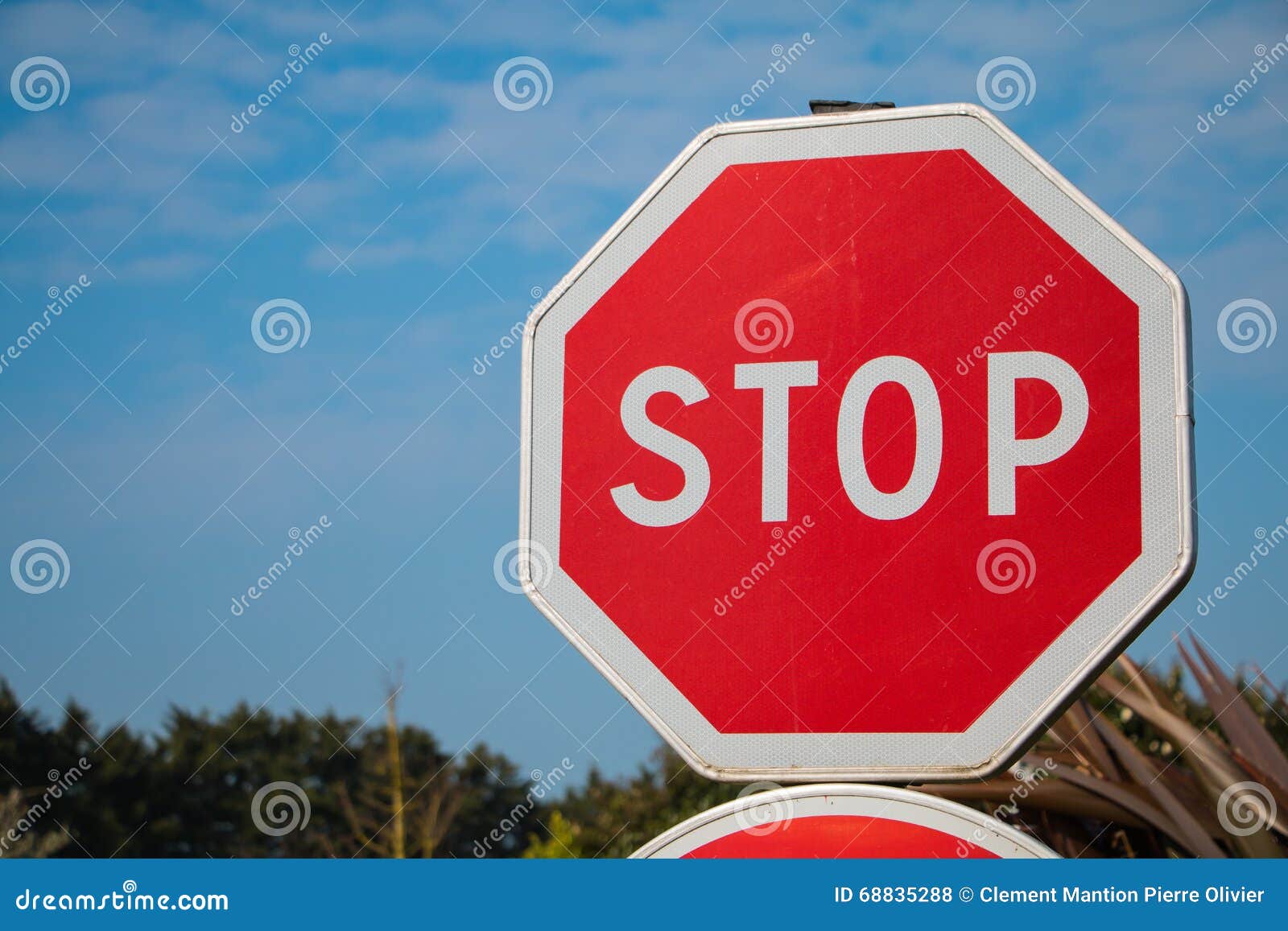 Stop sign with blue sky stock photo. Image of warning - 68835288