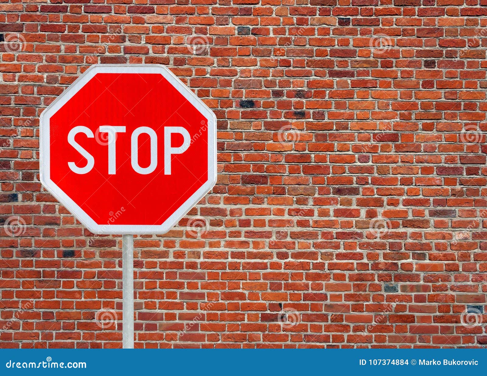 Bright Stop Sign Red Brick Background Stock Photos - Free & Royalty ...