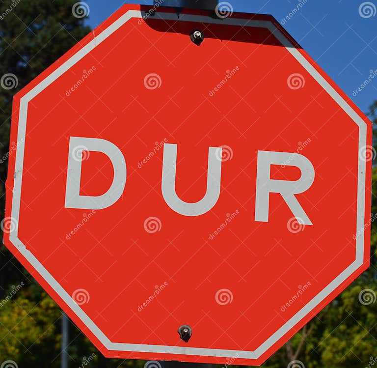 Stop sign DUR stock photo. Image of moving, language - 91679456