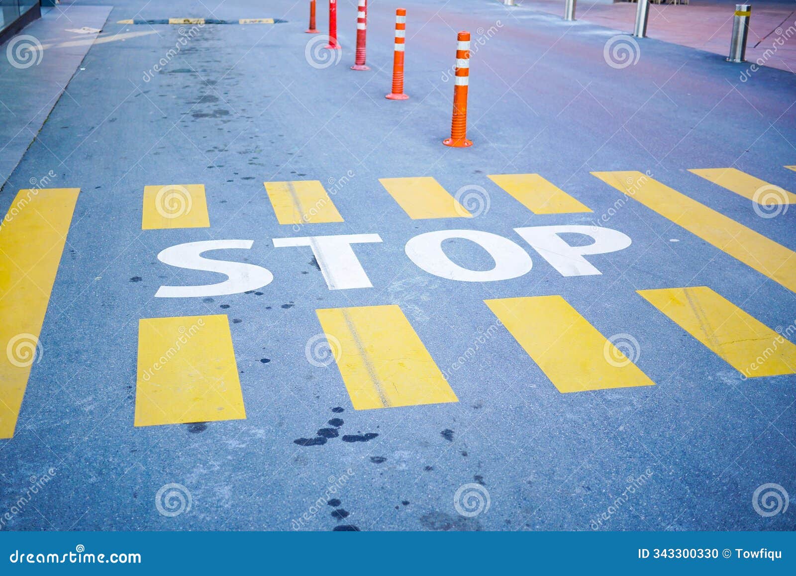 Stop sign on a empty road stock photo. Image of direction - 343300330