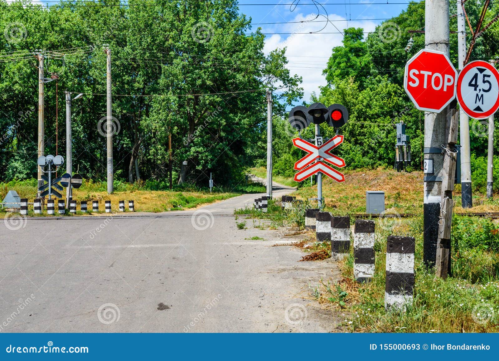 Stop Sign in Front of the Railroad Crossing Stock Image - Image of ...