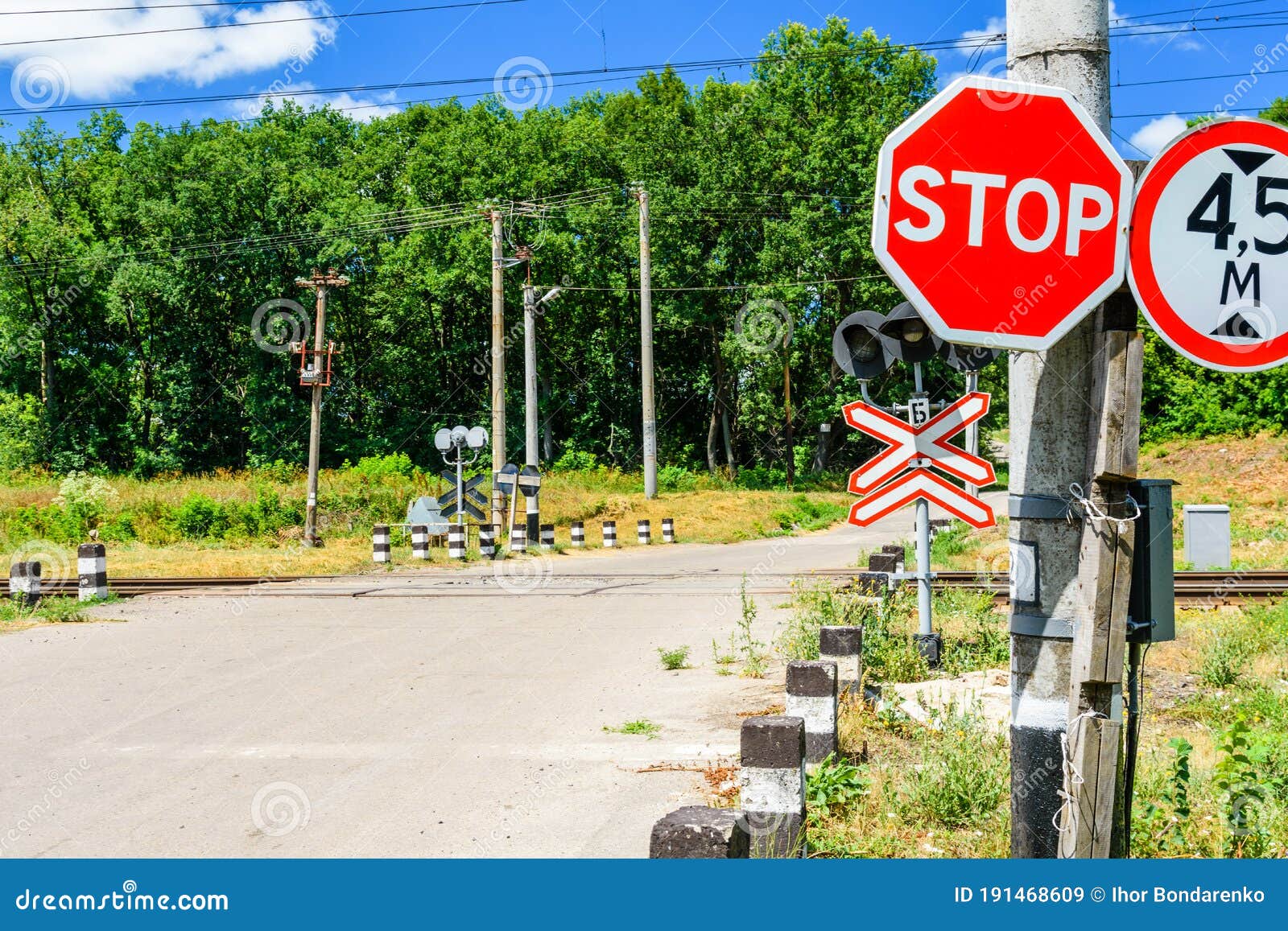 Stop Sign in Front of the Railroad Crossing Stock Image - Image of ...