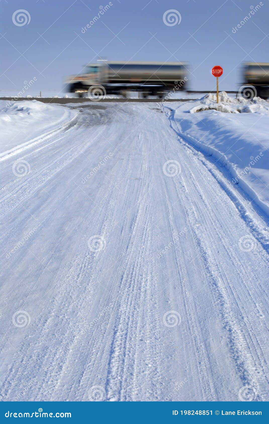 Stop Sign at Intersection in Winter Snowy Road Stock Image - Image of ...
