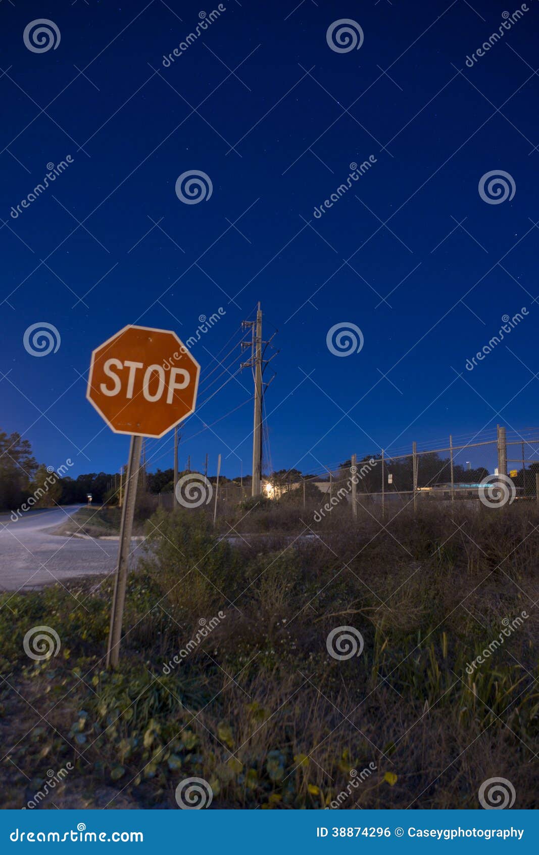 Stop Sign at Night stock photo. Image of blue, crossroads - 38874296