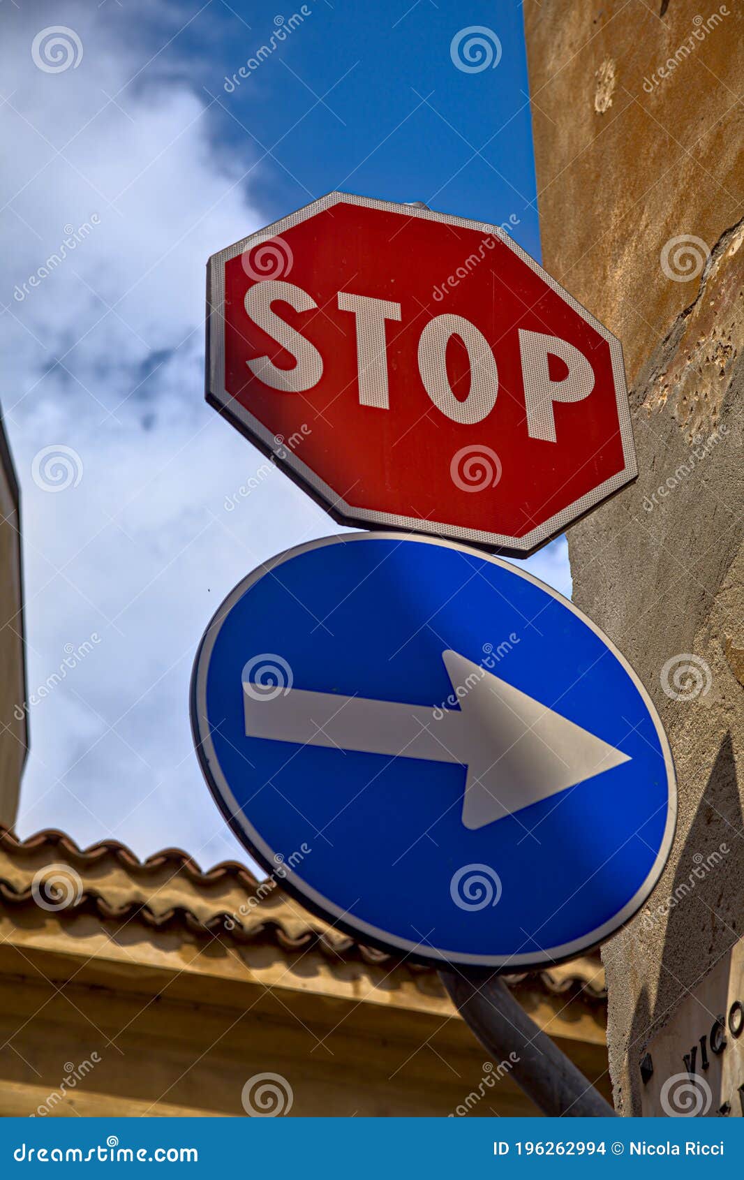Stop Sign and One Way only Sign with a Clear Sky As Background Stock ...