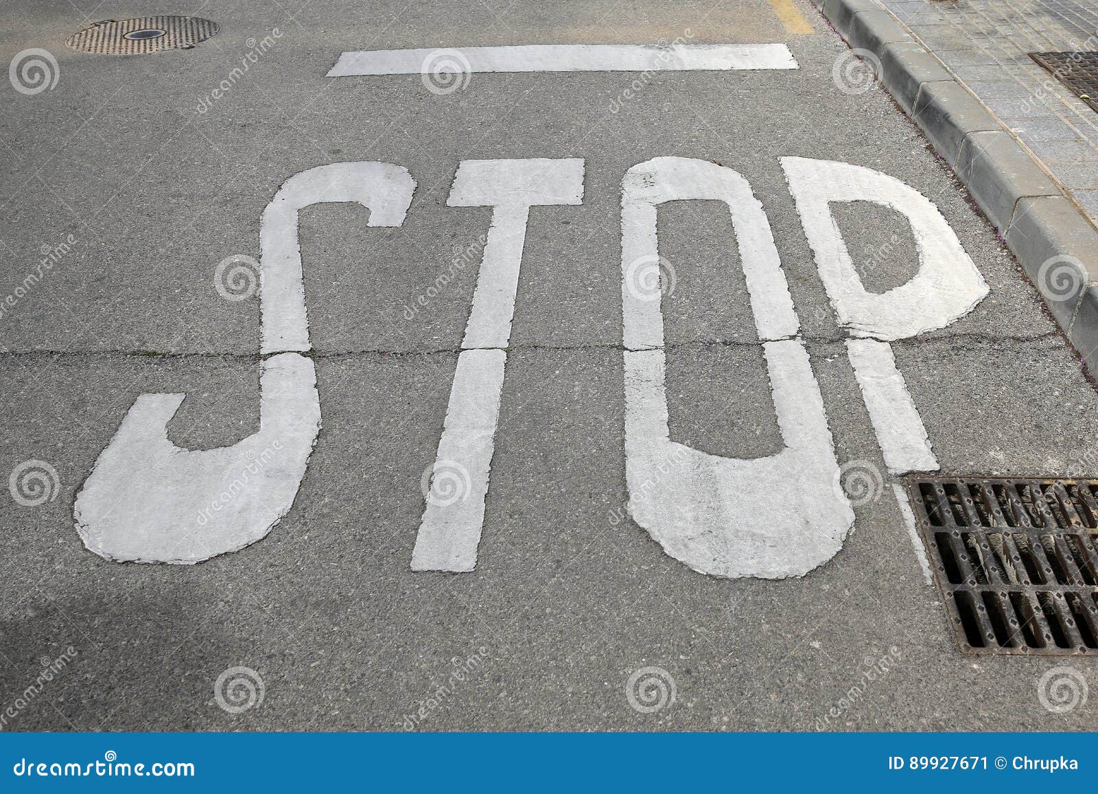 Stop Sign Painted on the Road Stock Image - Image of limit, white: 89927671
