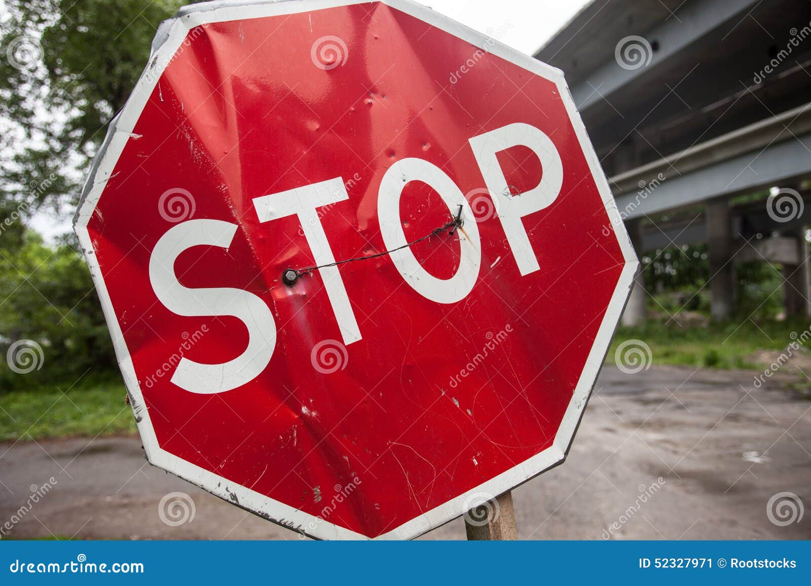 Stop Sign with Partly Bent Surface Stock Image - Image of strained ...