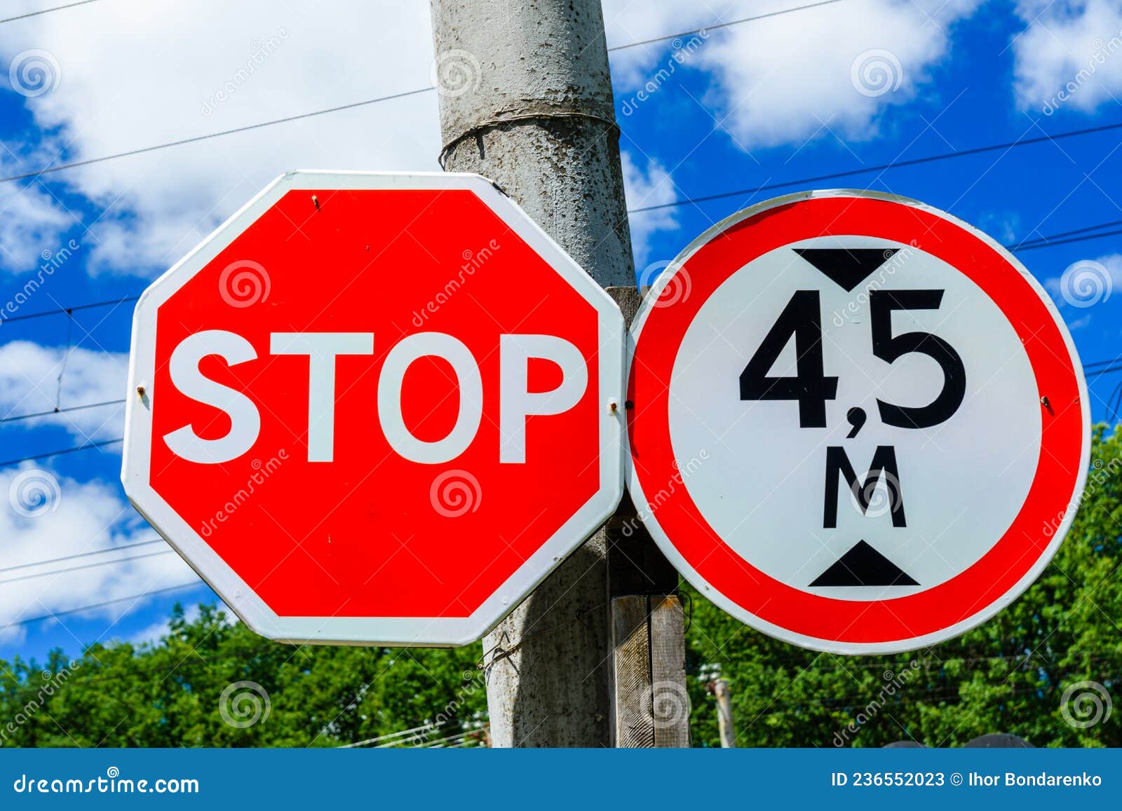 Stop Sign on a Post at Roadside Against Blue Sky Stock Image - Image of ...