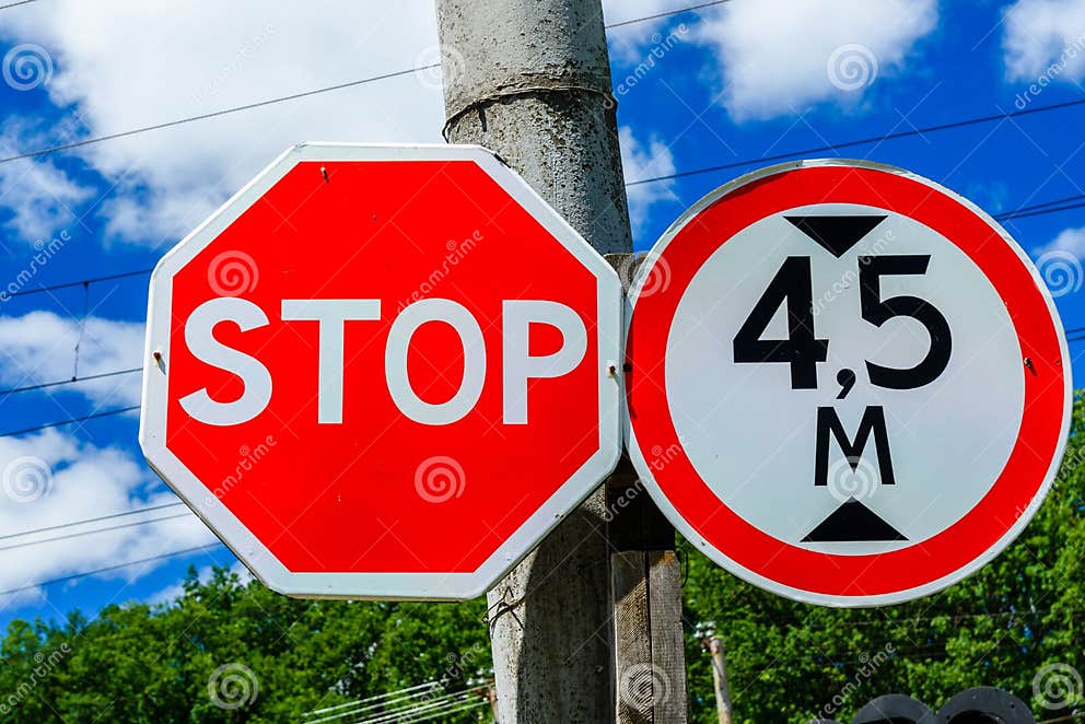Stop Sign on a Post at Roadside Against Blue Sky Stock Image - Image of ...
