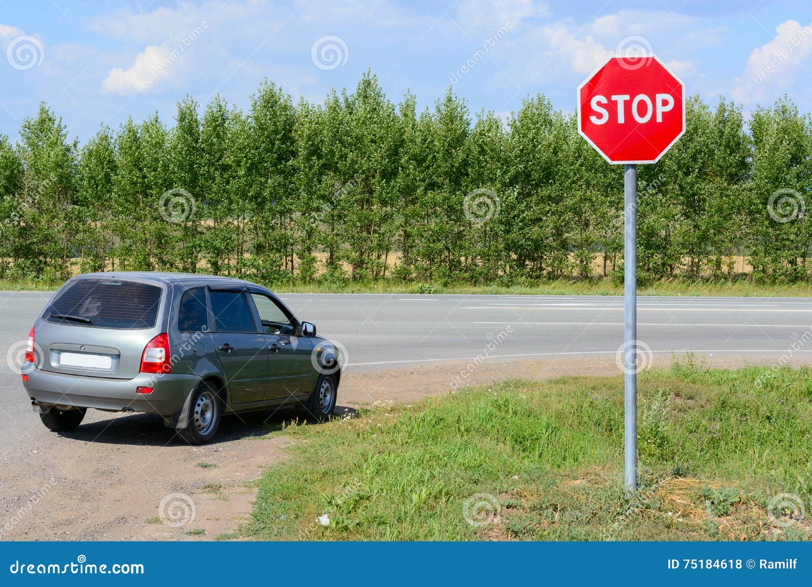 Stop sign on the road stock photo. Image of trip, speed - 75184618