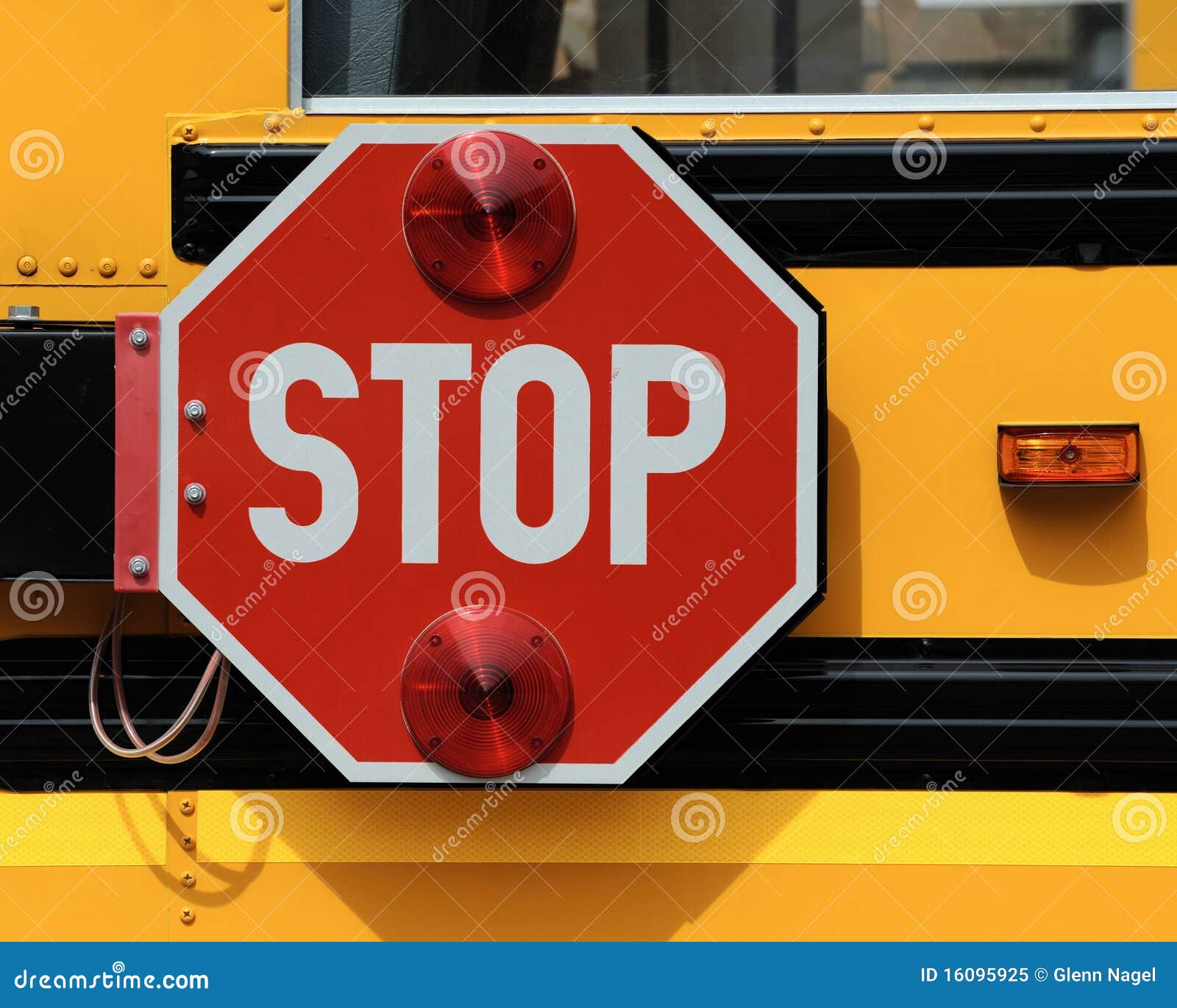 Stop sign on school bus stock image. Image of closeup - 16095925