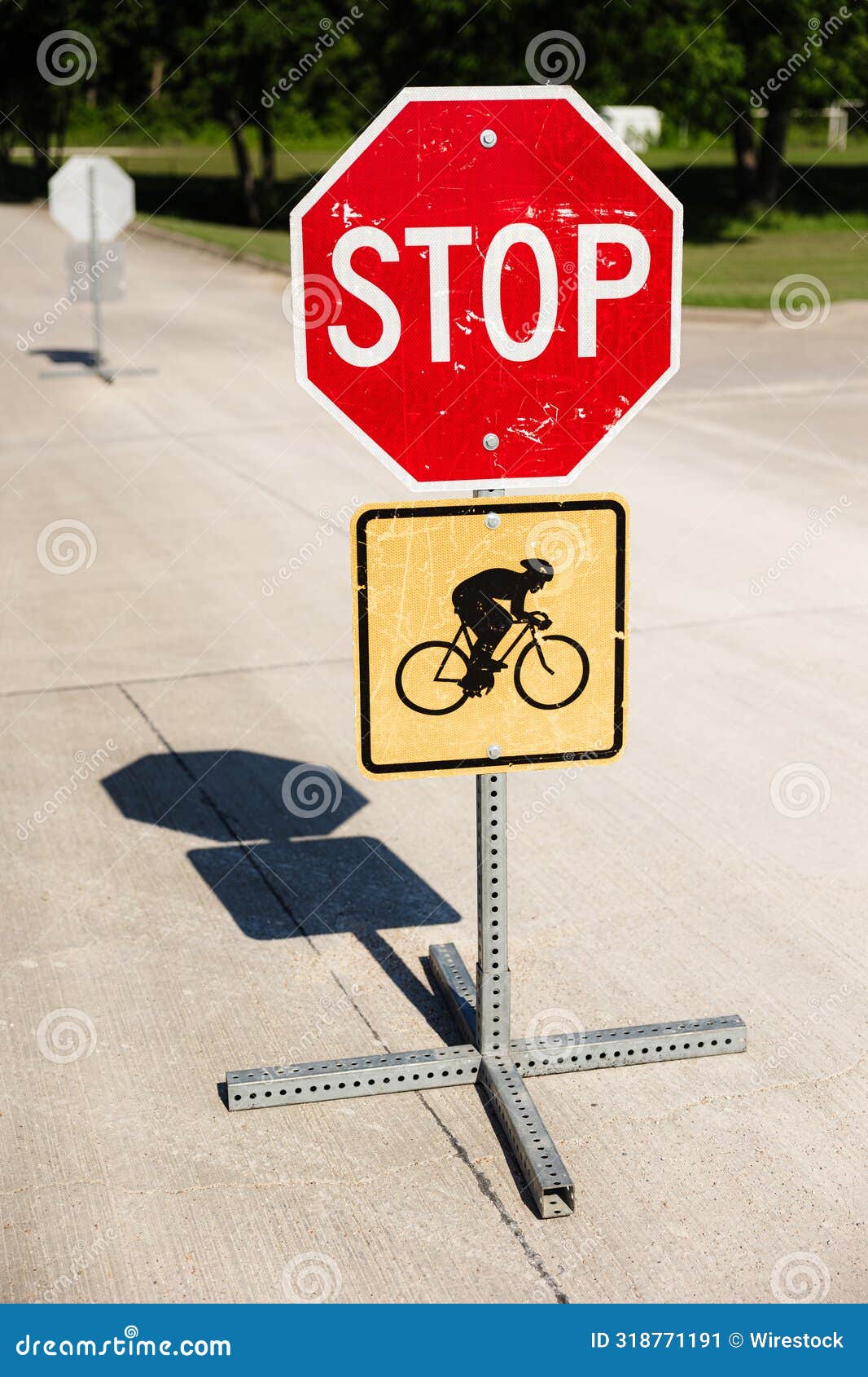 Stop Sign with Sticker and Man on Bicycle Stock Image - Image of ...