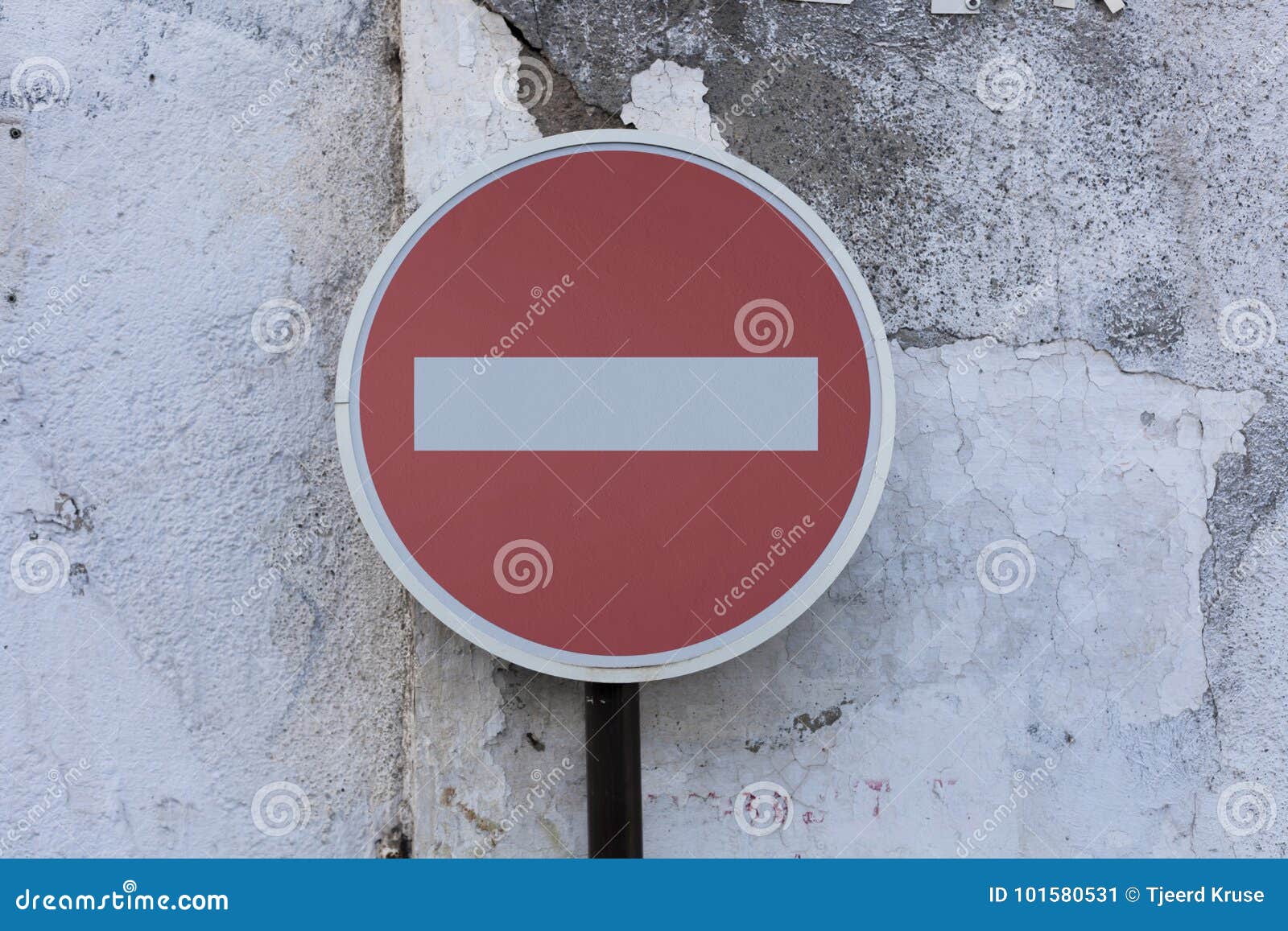 Stop Sign on a stone wall stock image. Image of risk - 101580531