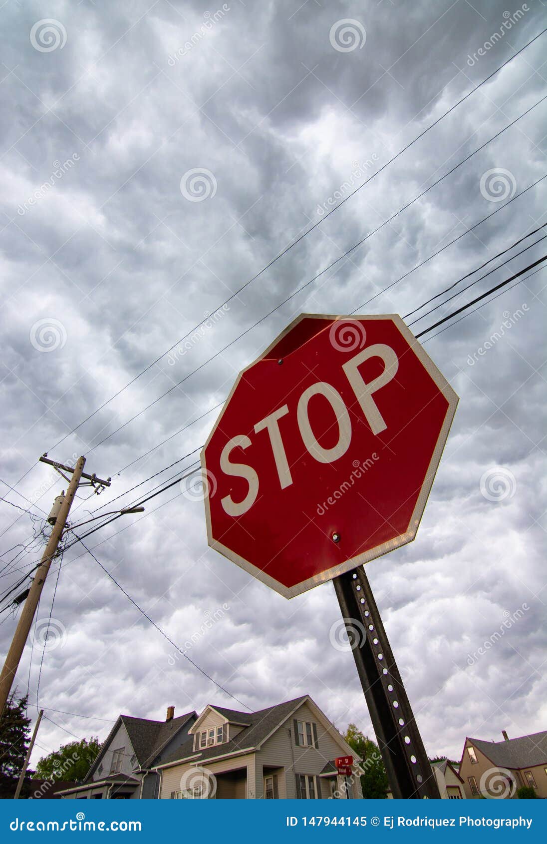Stop Sign with Storm Clouds Stock Image - Image of blue, clouds: 147944145