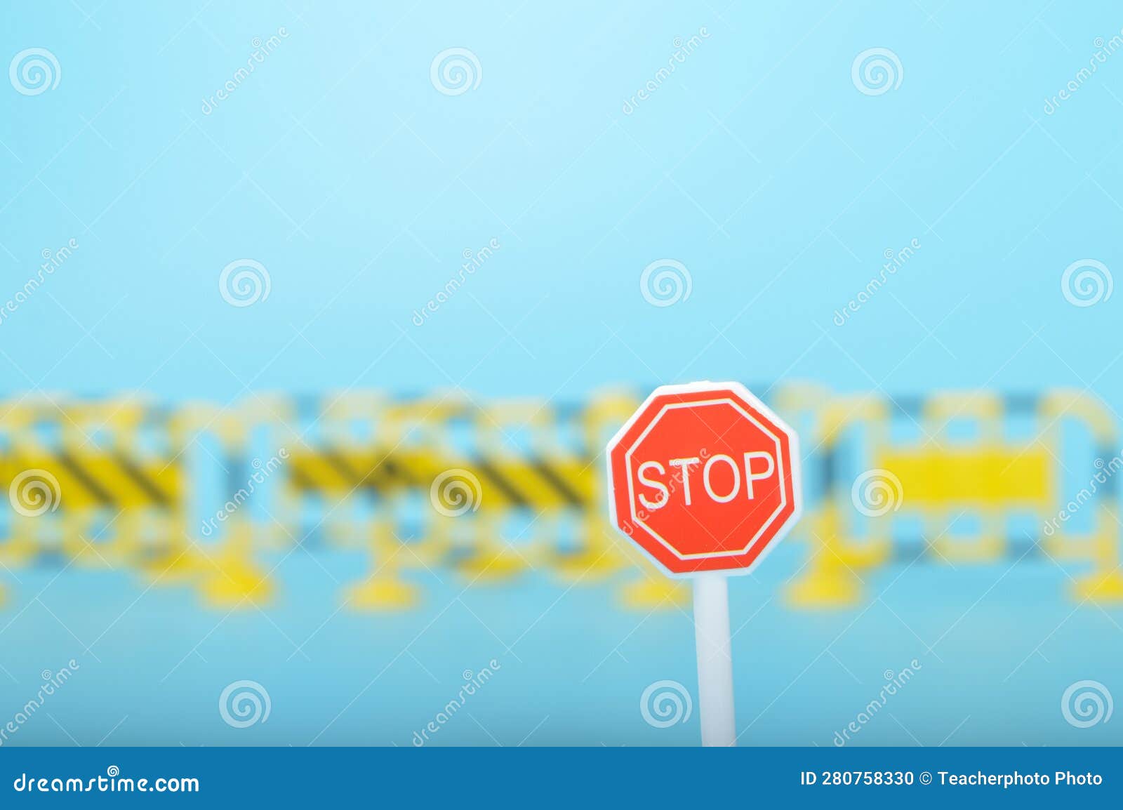 Stop Sign Symbol Isolated on a Blue Background Stock Photo - Image of ...