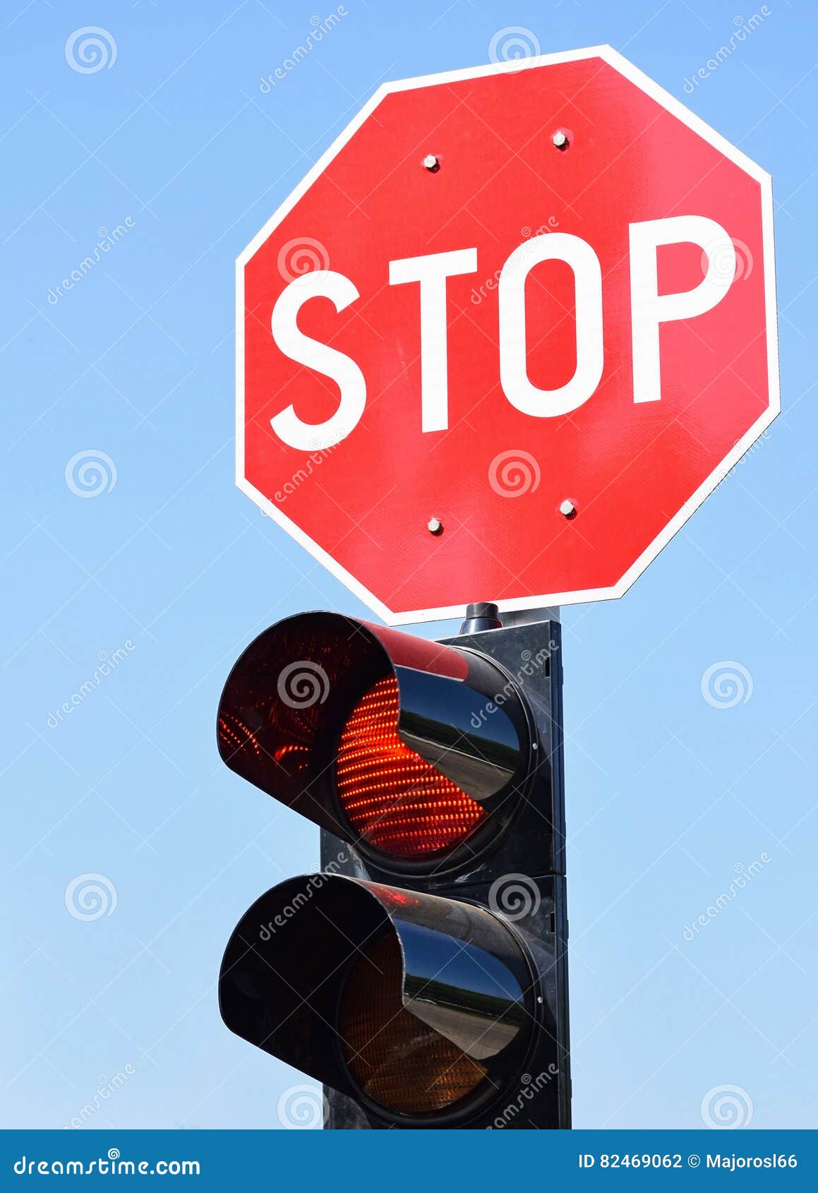 Stop Sign and Traffic Lights Stock Photo - Image of light, asphalt ...