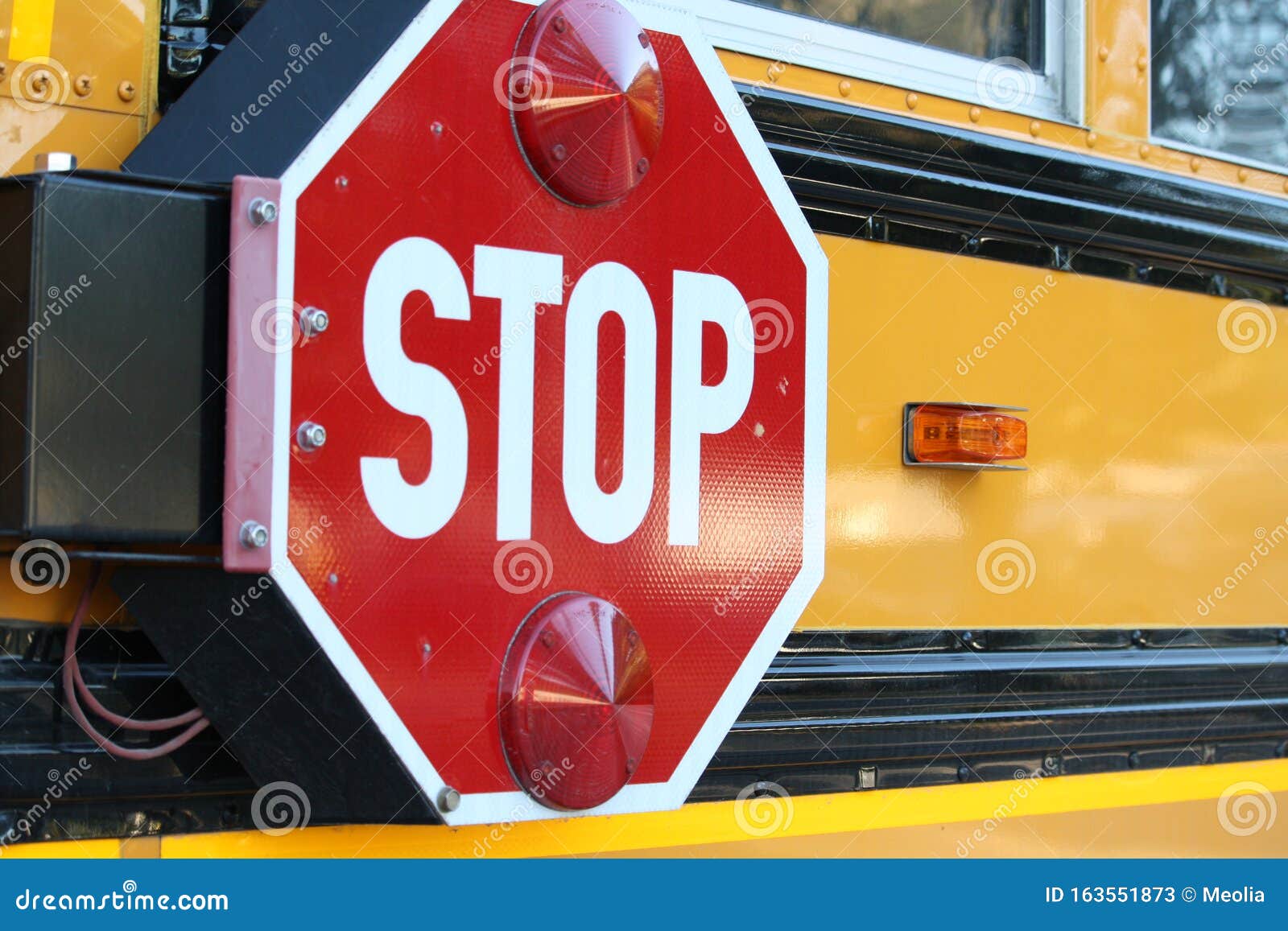 Stop sing on a school bus stock image. Image of enforcement - 163551873