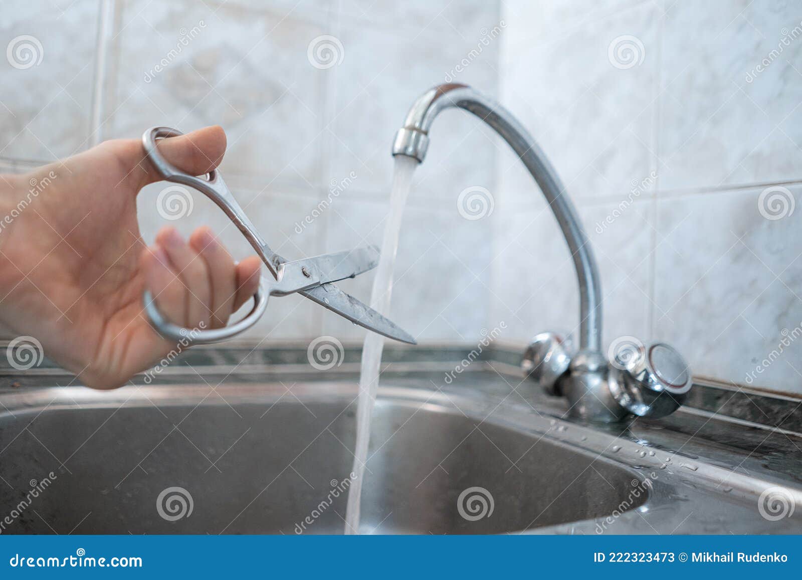 Stop Wasting the Pure Water, Hand with Scissors Cut the Water Stream ...