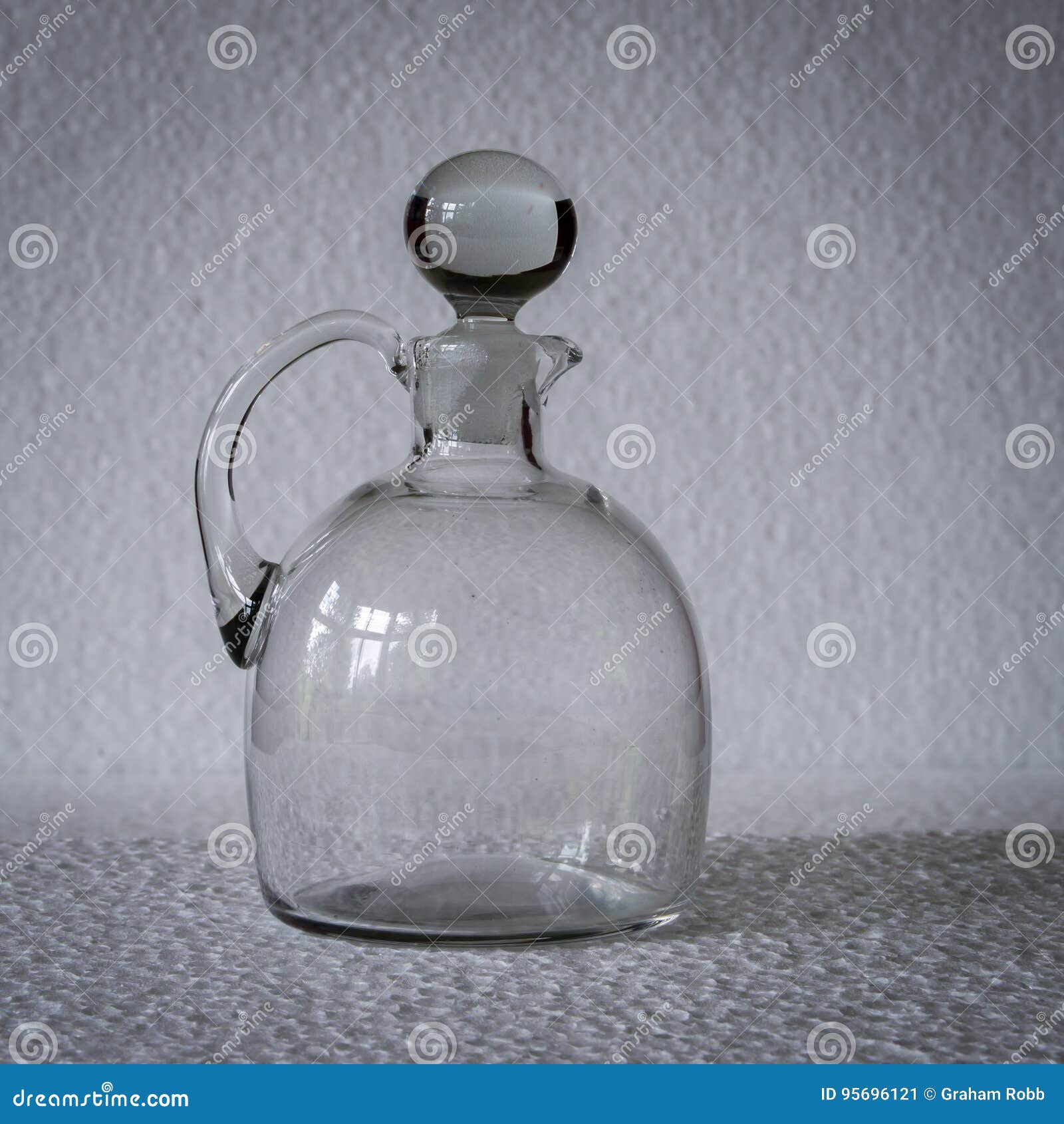 A Stoppered Clear Glass Pitcher Stock Image - Image of liquid, side ...