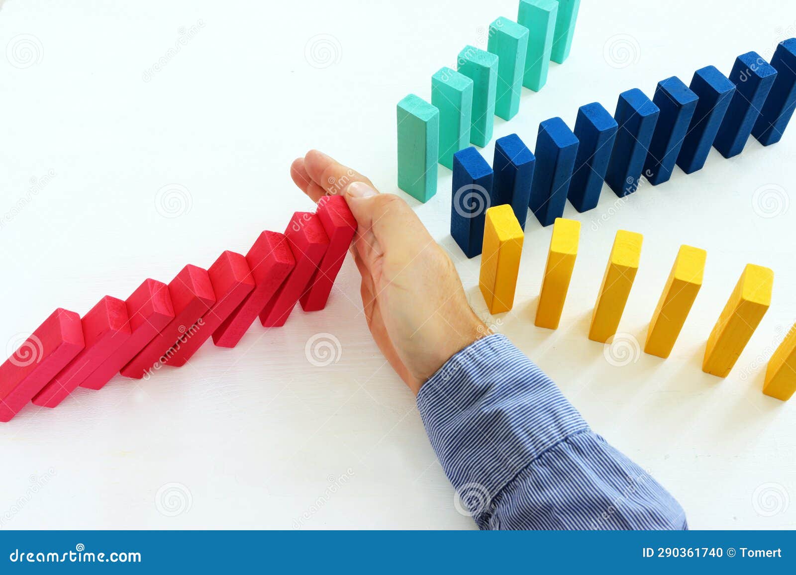Stopping the Domino Effect. Executive and Risk Control Concept Stock ...
