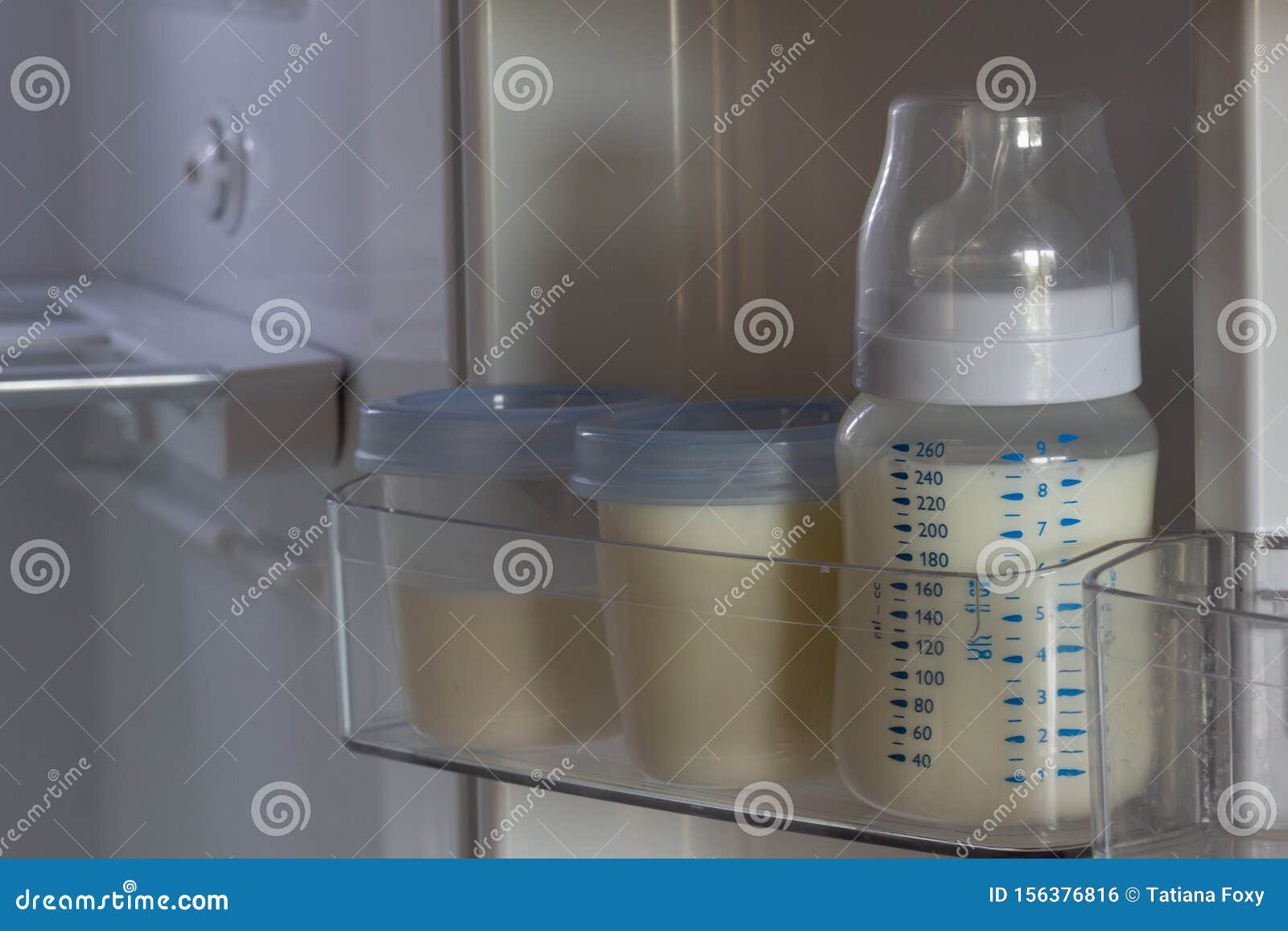 Storage Breast Milk in the Side of the Refrigerator Stock Photo - Image ...