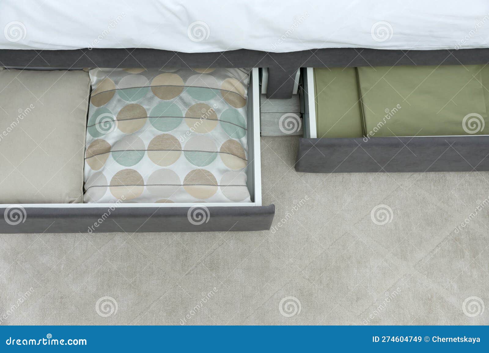 Storage Drawers with Bedding Under Modern Bed in Room, Above View Stock ...