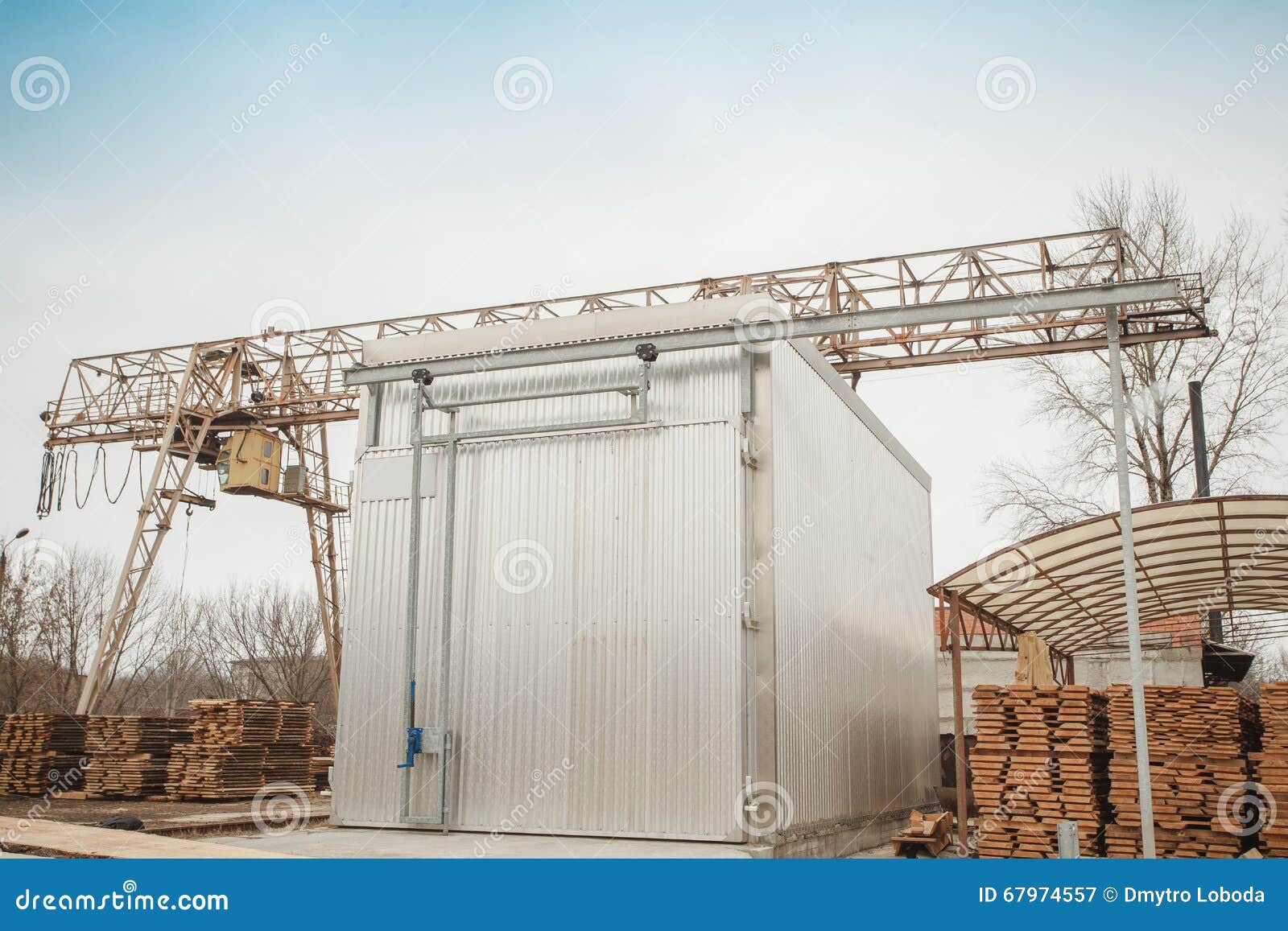 Storage timber crane stock image. Image of primary, lumber - 67974557