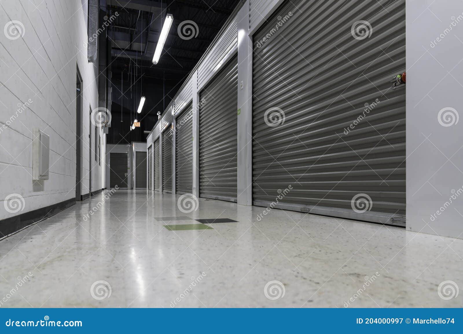 Storage Warehouse Interior. Metal Garage Doors with Locks Stock Image ...