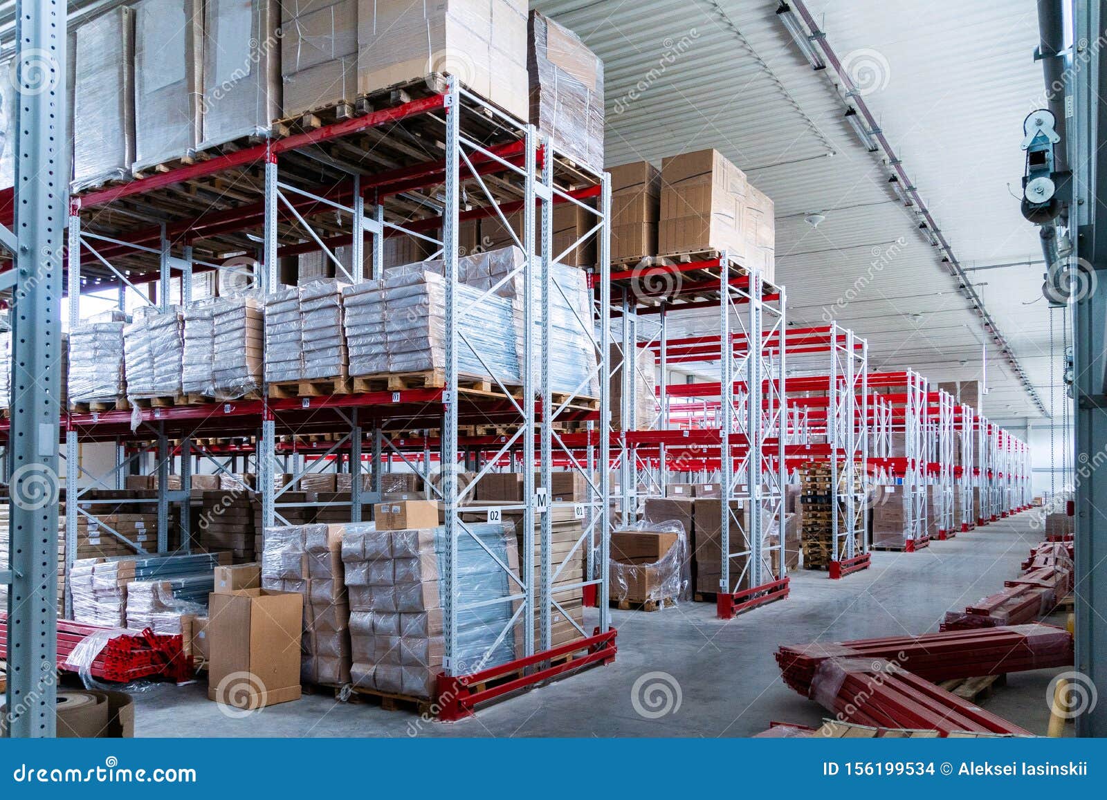 Storage Warehouse and Racks on Which There are Cardboard Boxes with ...
