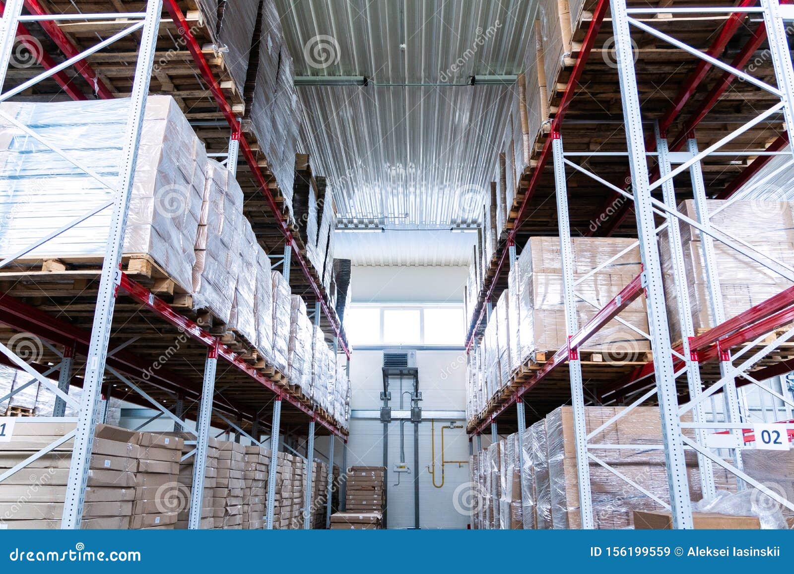 Storage Warehouse and Racks on Which There are Cardboard Boxes with ...